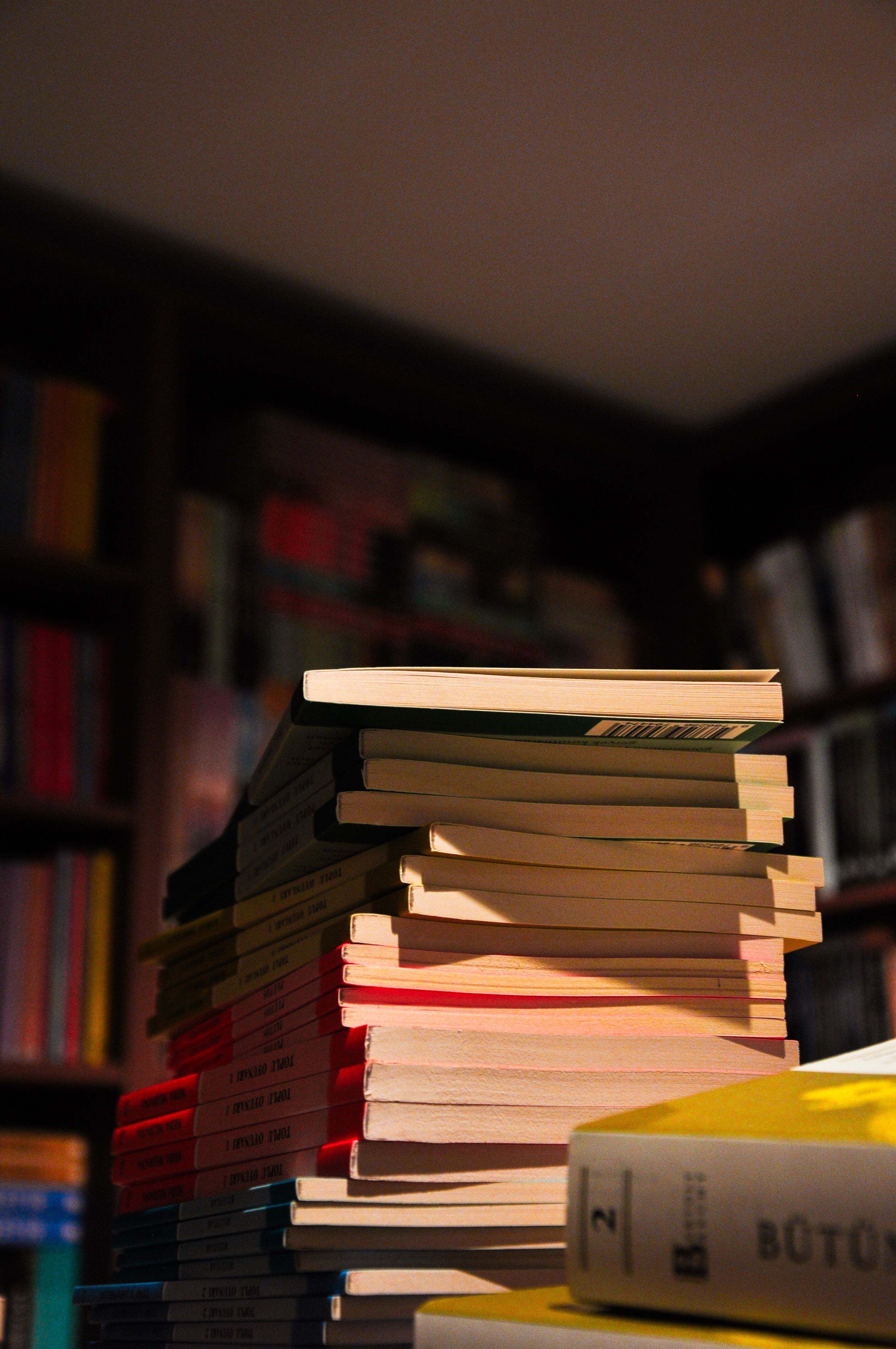 Stack of Books in Cozy Library Setting · Free Stock Photo