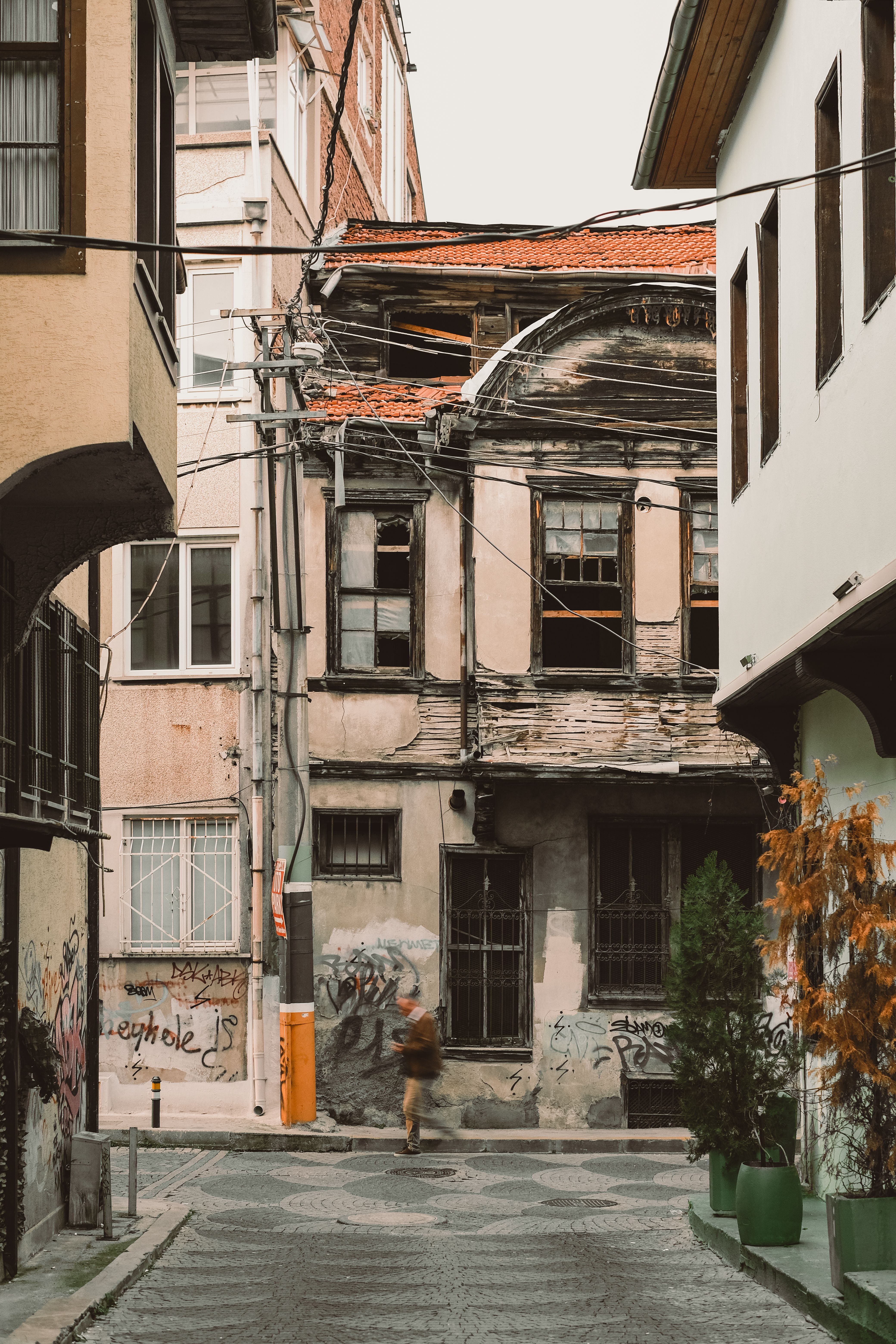 Urban Alleyway with Weathered Building · Free Stock Photo