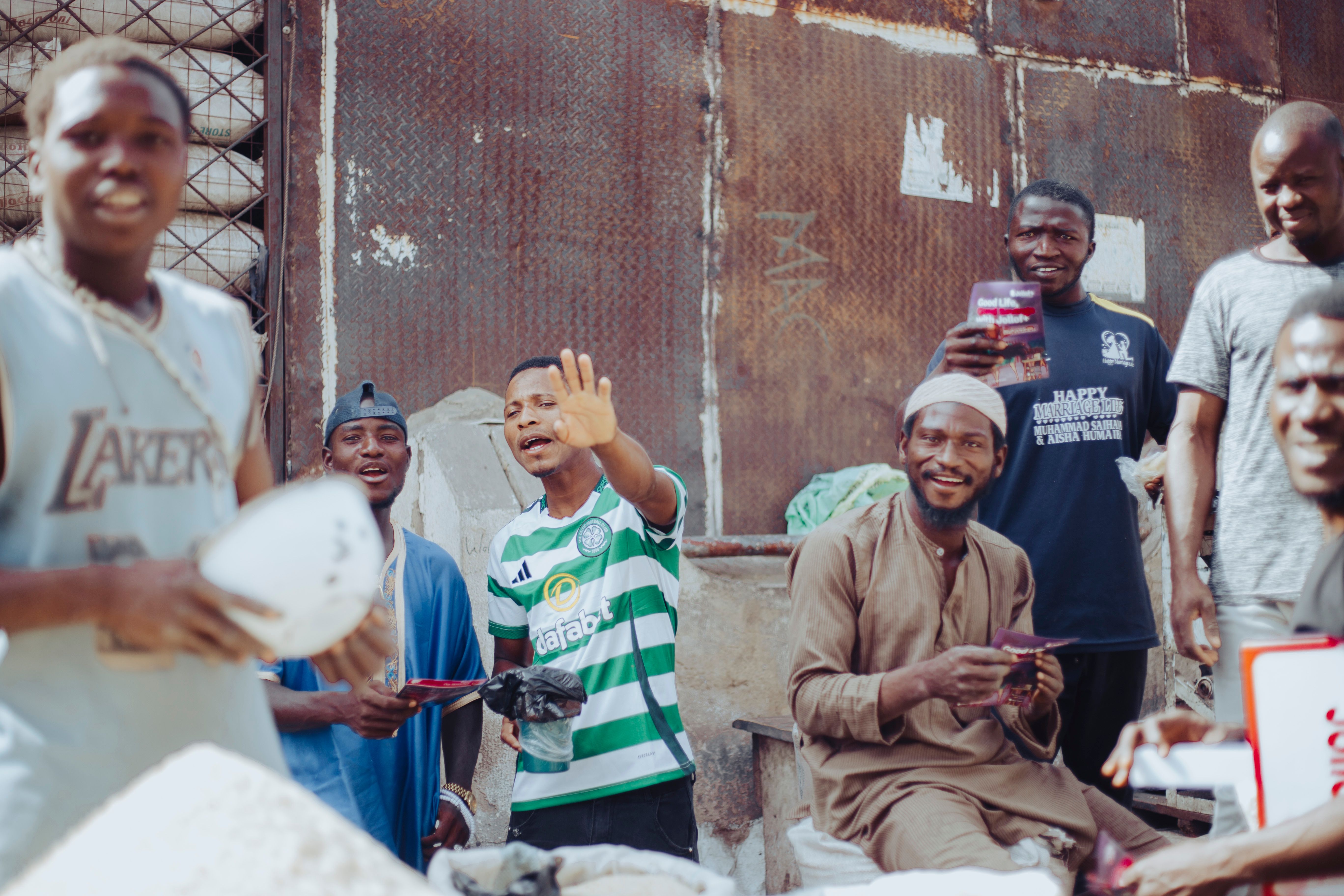 Group of Men Socializing in Urban Setting · Free Stock Photo