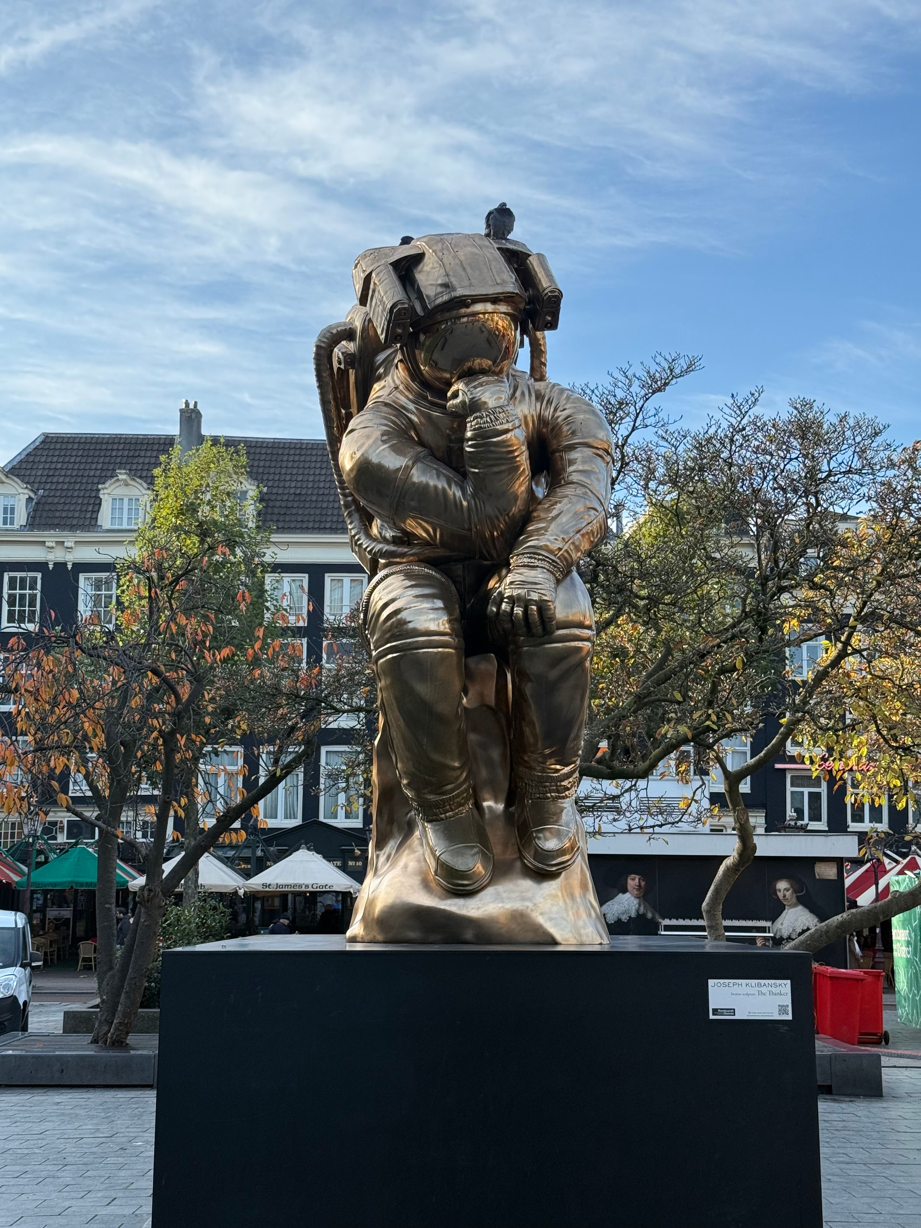 Bronze Astronaut Sculpture in Amsterdam Square · Free Stock Photo