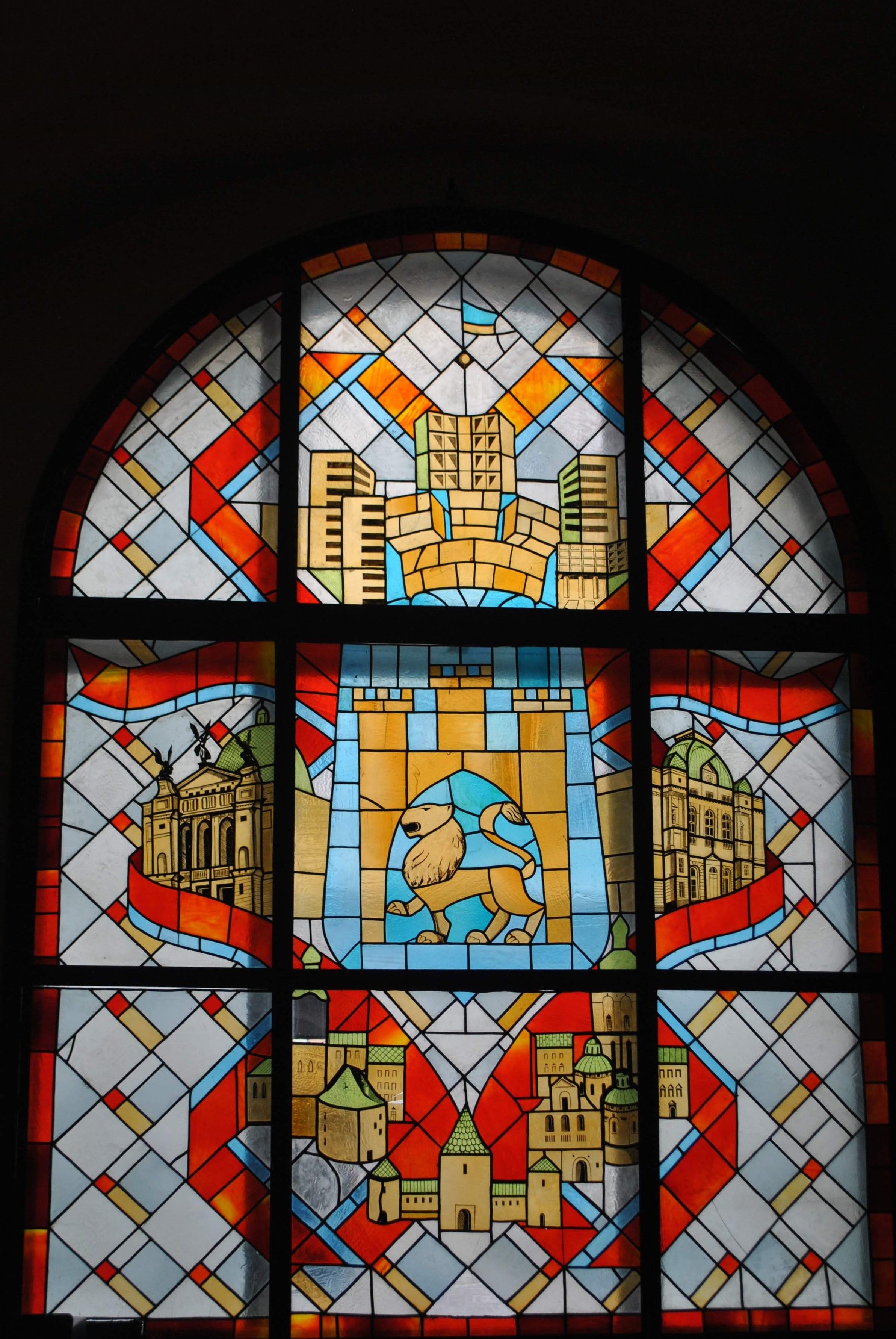 Colorful Stained Glass Window with Lion Design · Free Stock Photo