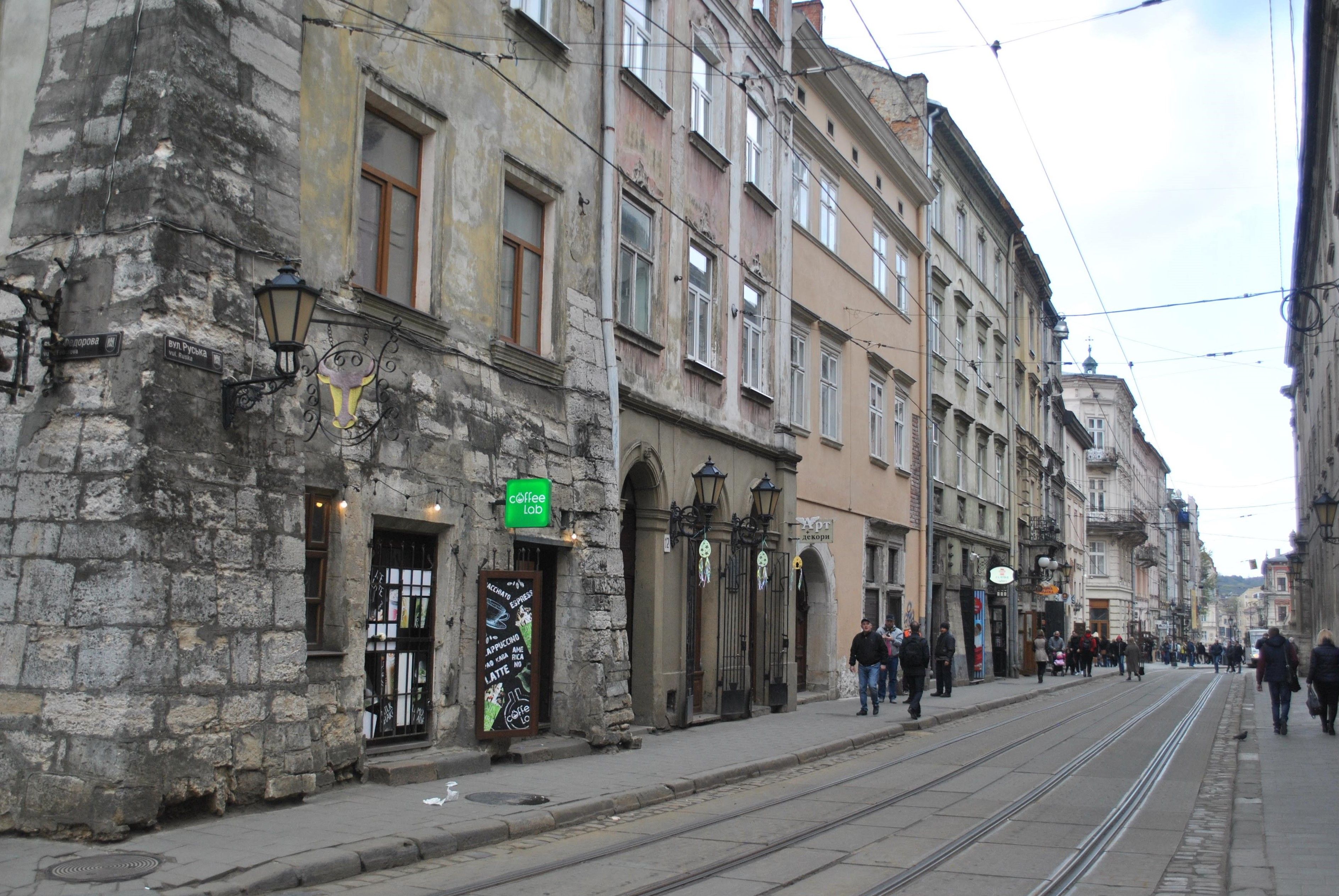Historic European Street Scene with Tram Tracks · Free Stock Photo