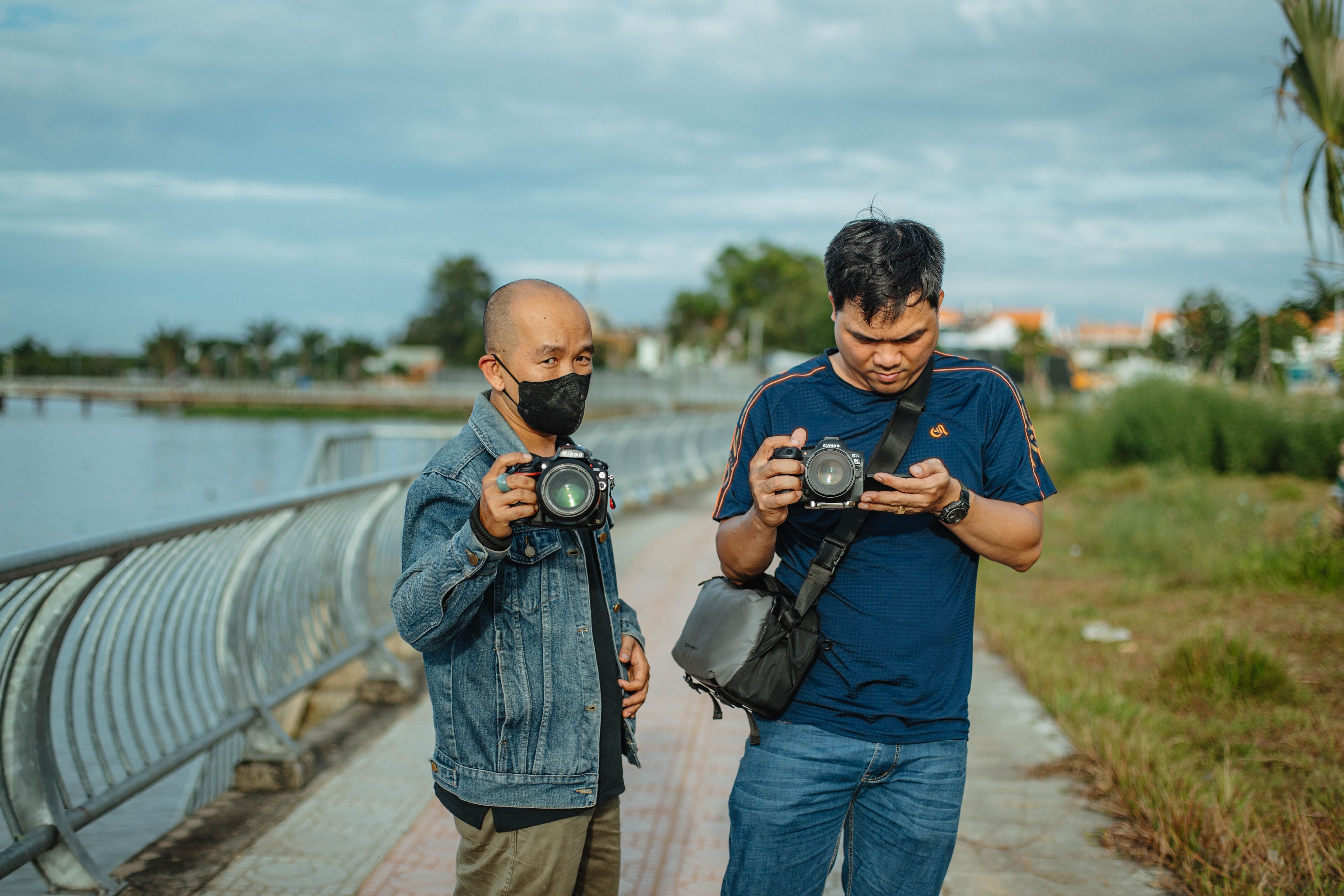 Outdoor Photographers with Cameras on Pathway · Free Stock Photo
