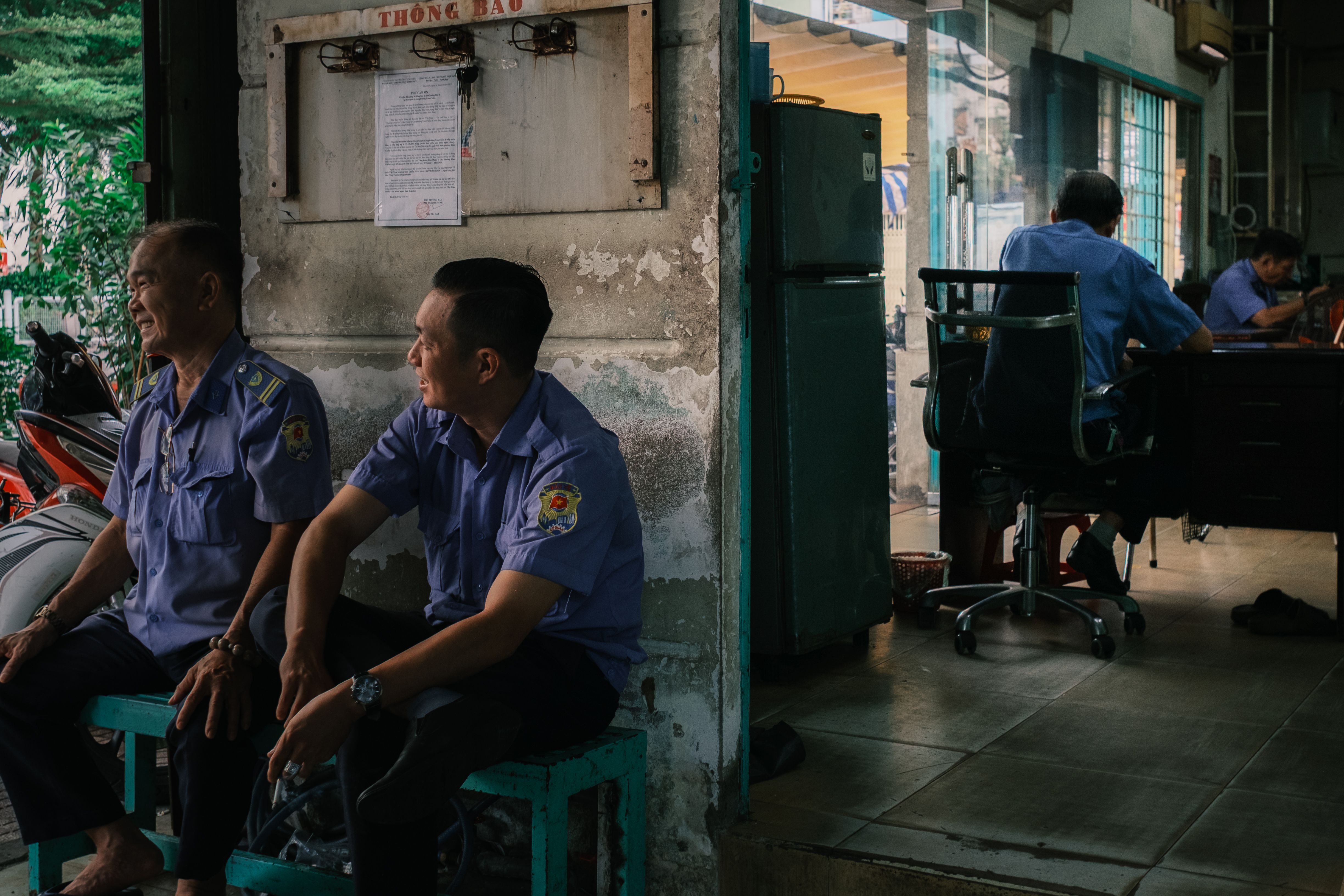 Security Guards Relaxing in Indoor Office Space · Free Stock Photo