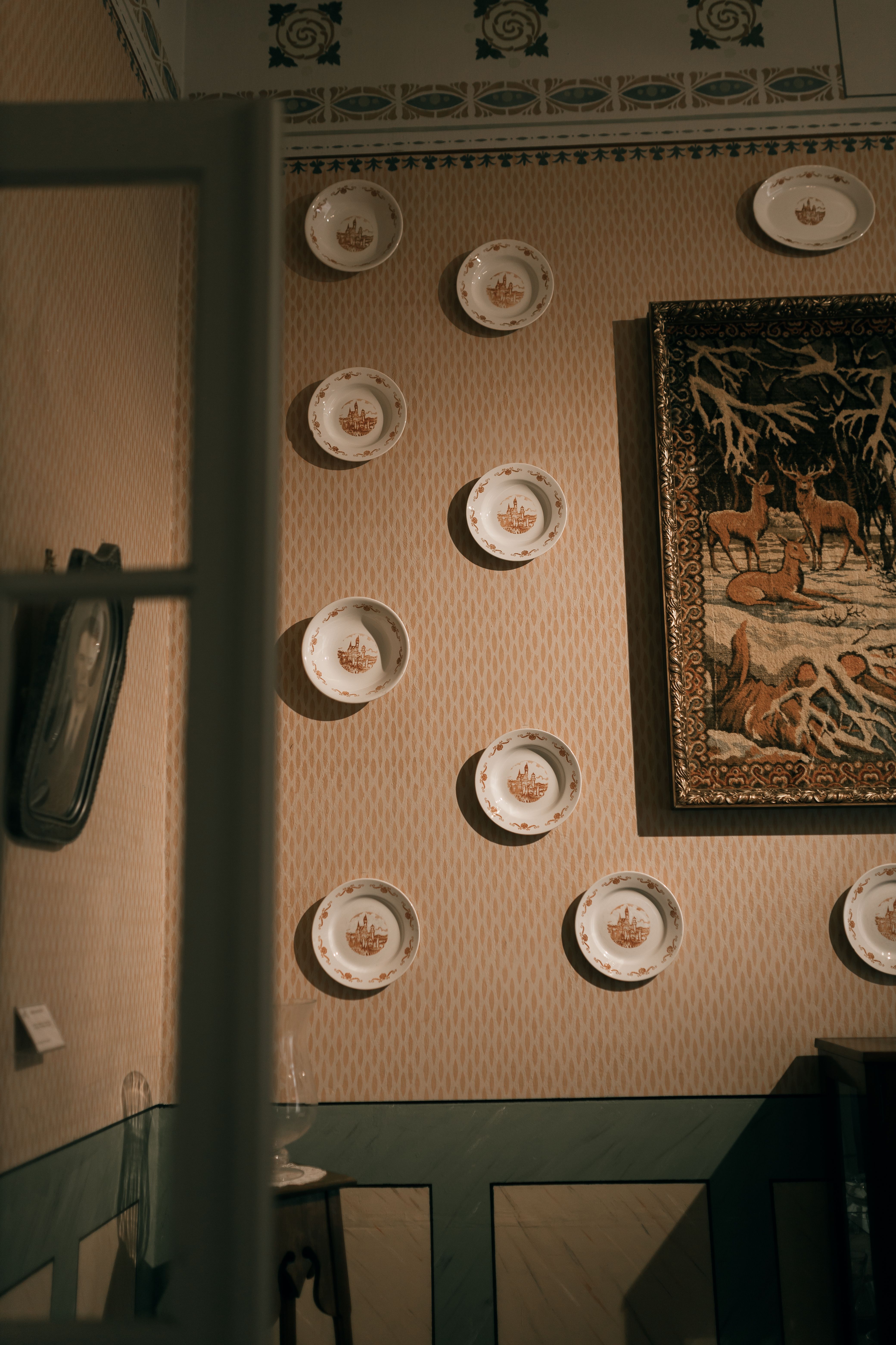 Elegant Vintage Dining Room Interior with Plates · Free Stock Photo