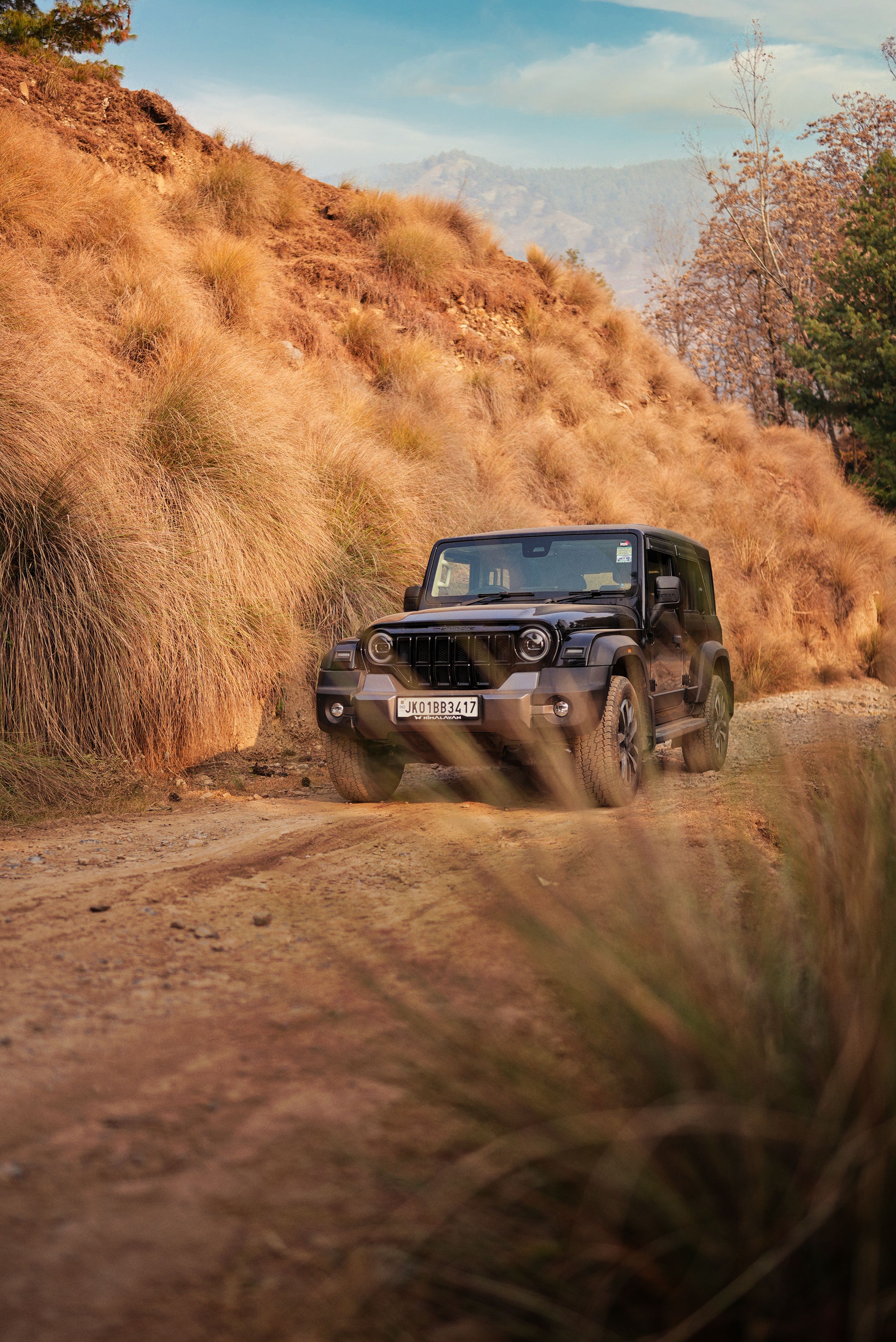 Off-Road SUV on Scenic Mountain Trail · Free Stock Photo