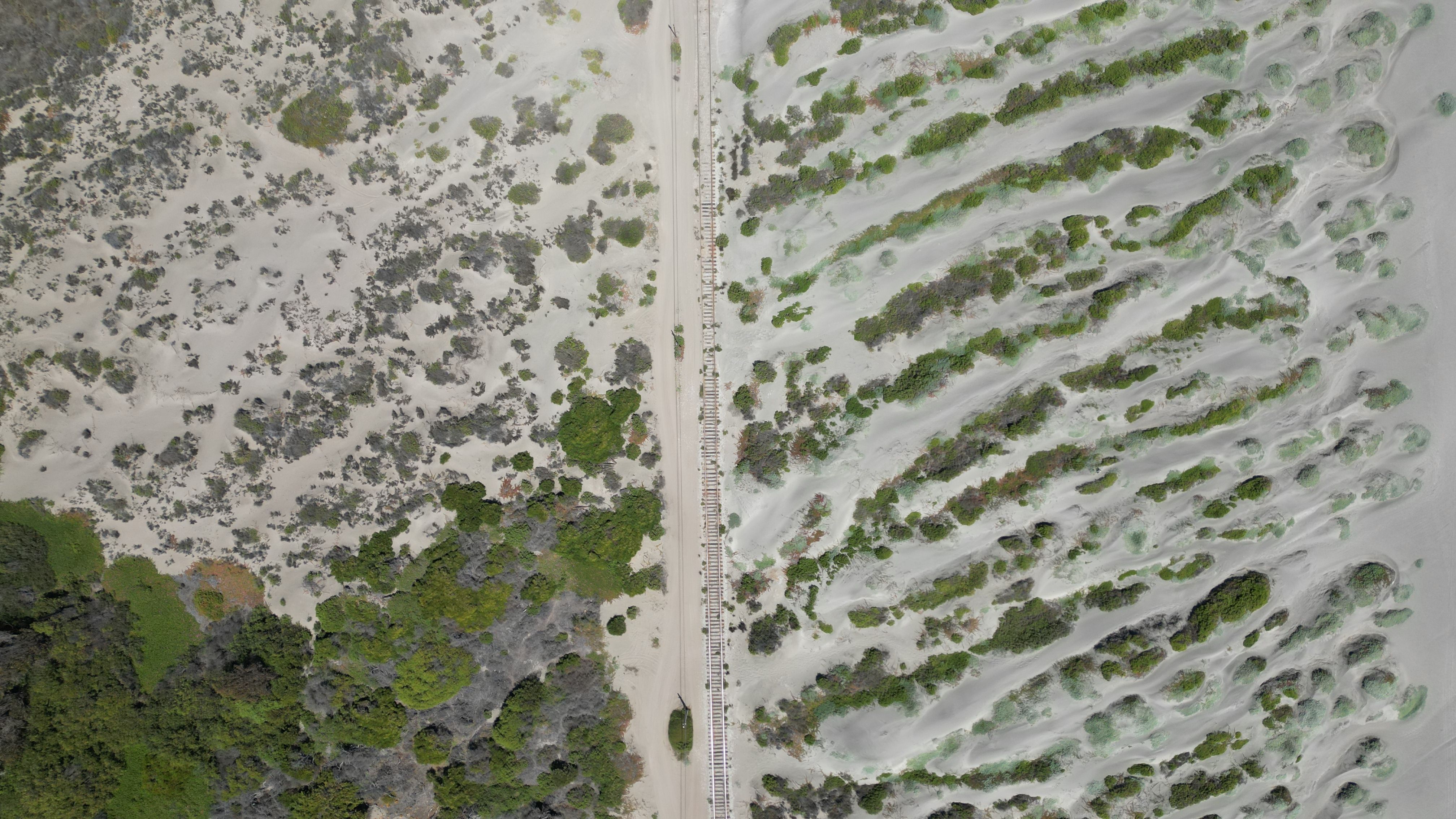 Aerial View of Sandy Coastal Landscape · Free Stock Photo