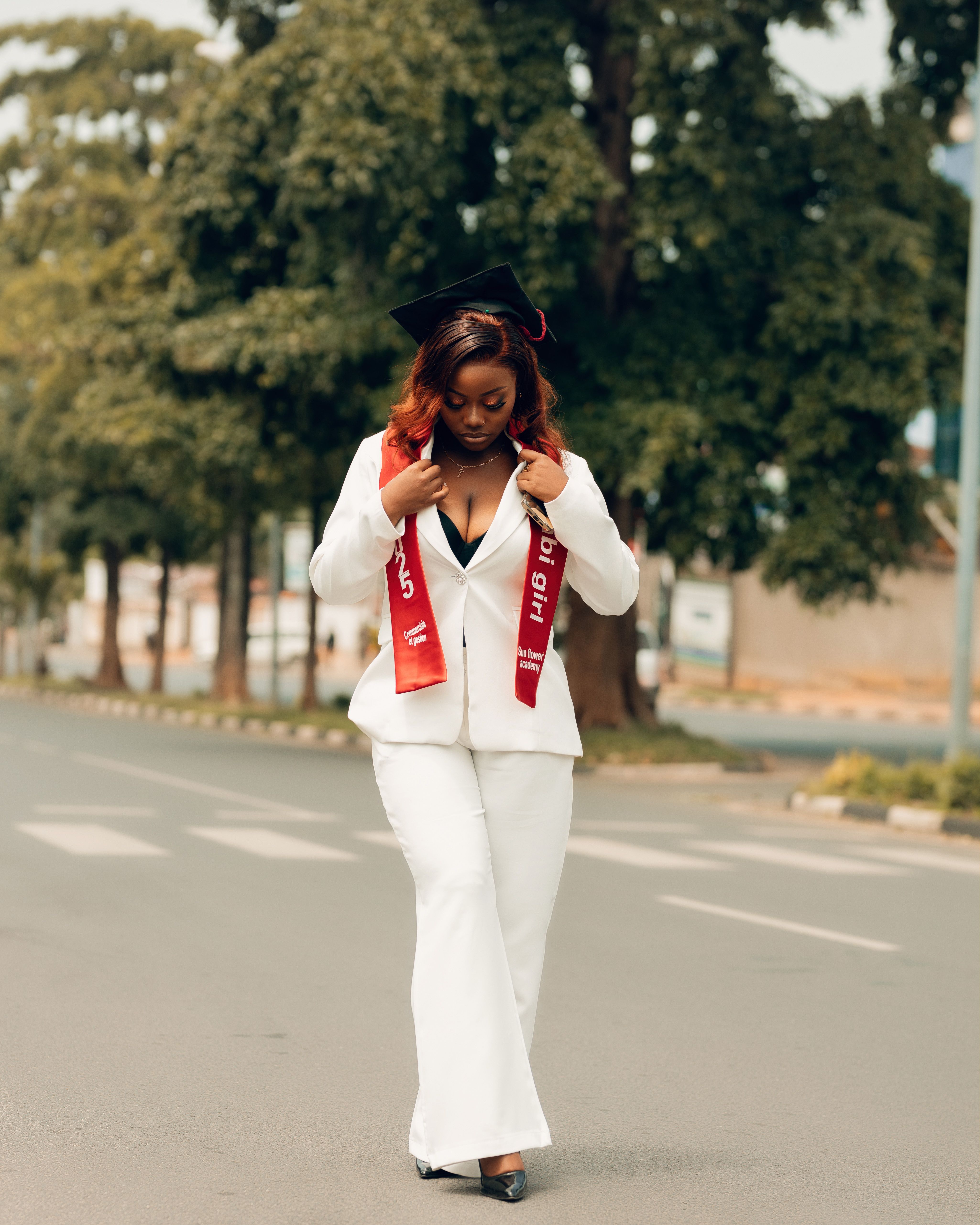 Elegant Graduation Portrait on a City Street · Free Stock Photo
