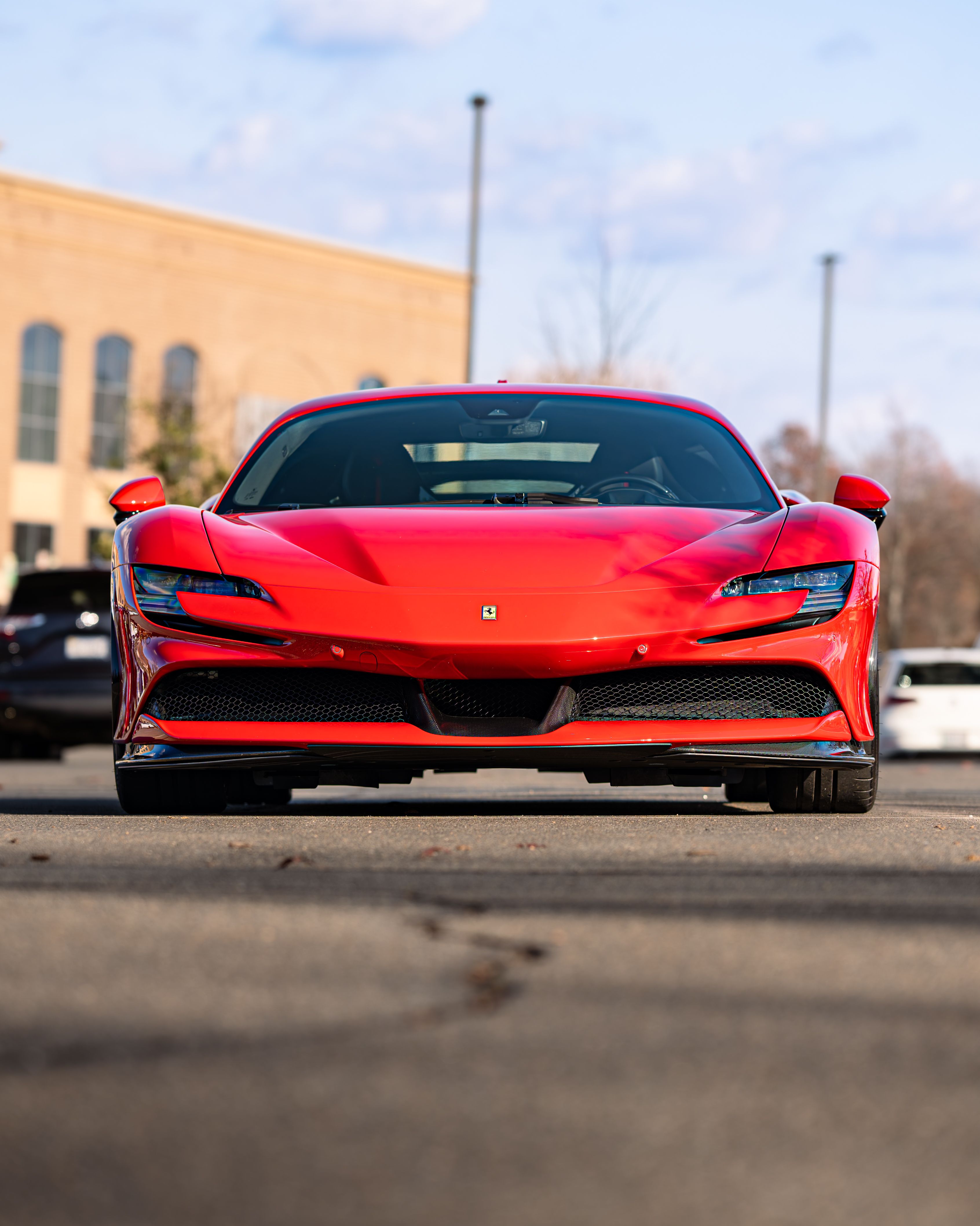 Striking Front View of a Red Luxury Sports Car · Free Stock Photo