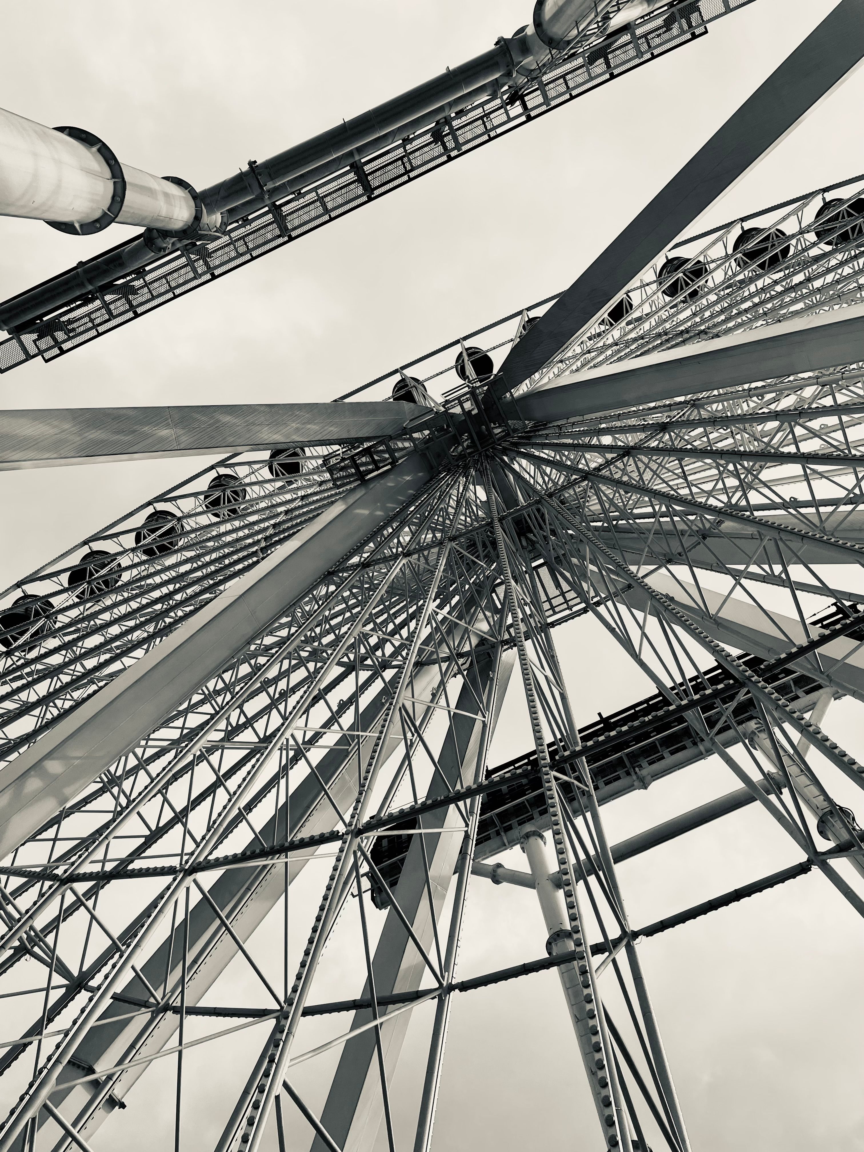 Monochrome Ferris Wheel from Unique Perspective · Free Stock Photo