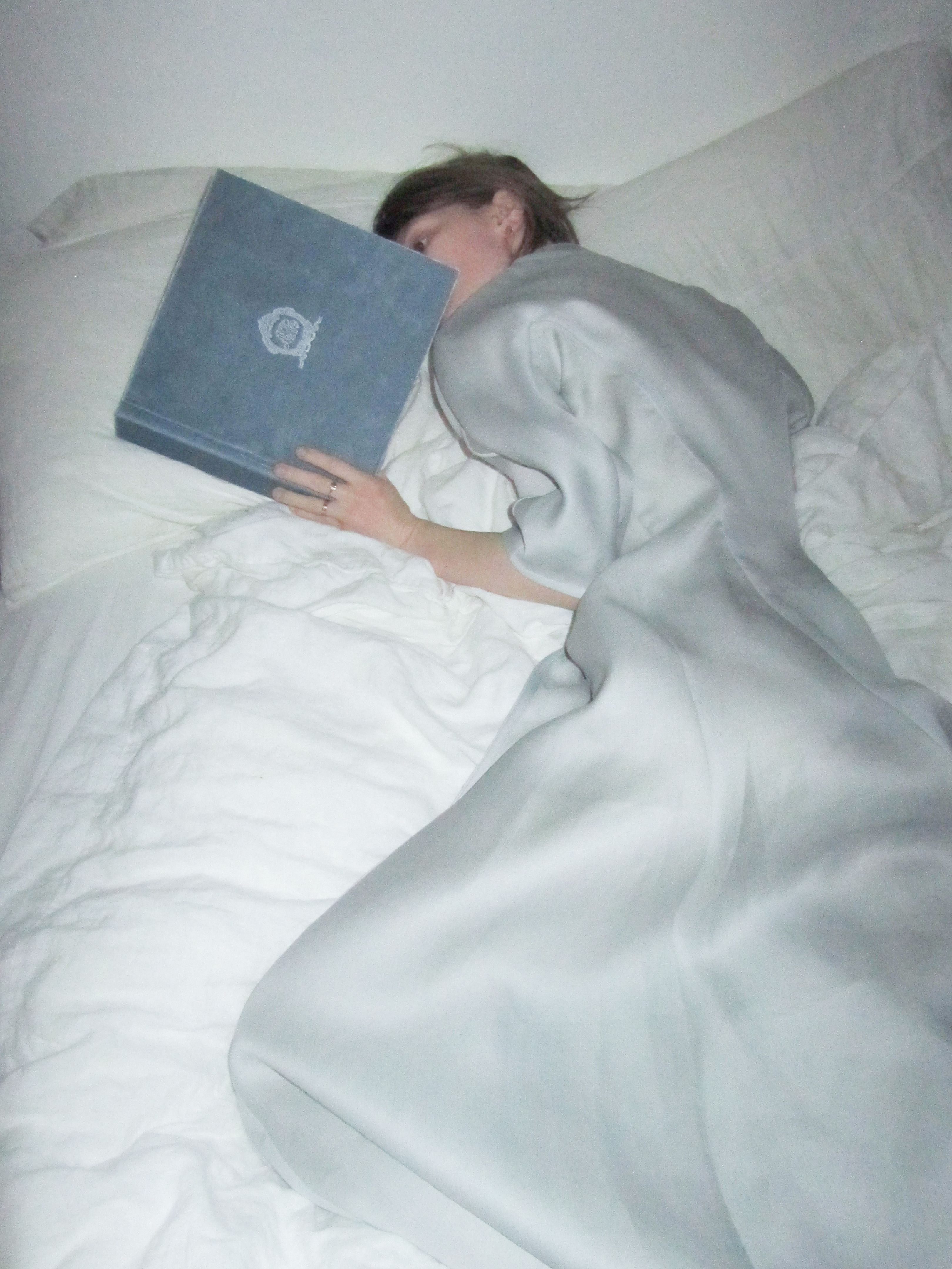Woman Sleeping with Book in Bed · Free Stock Photo