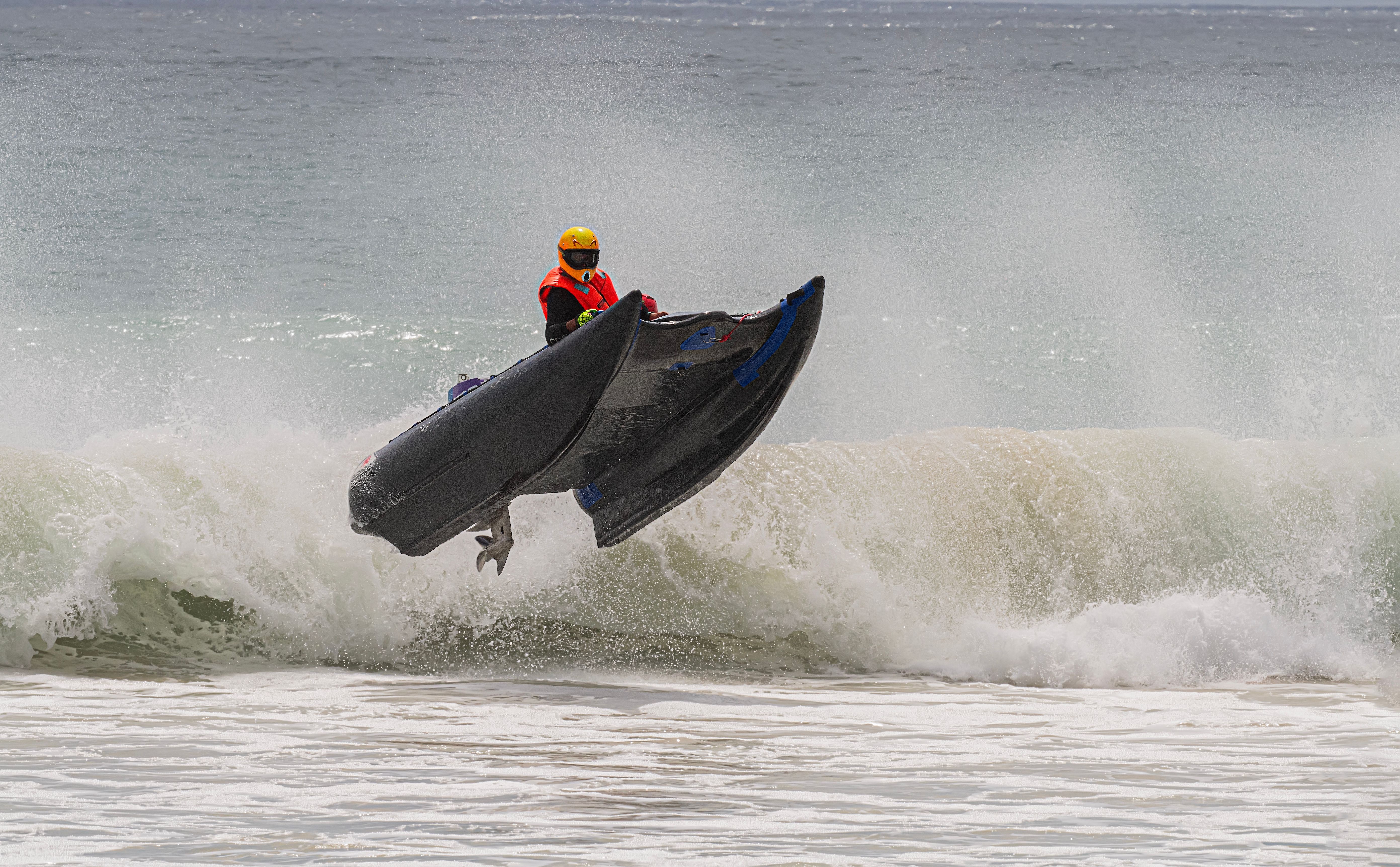Thrilling Jet Ski Stunt Over Ocean Waves · Free Stock Photo