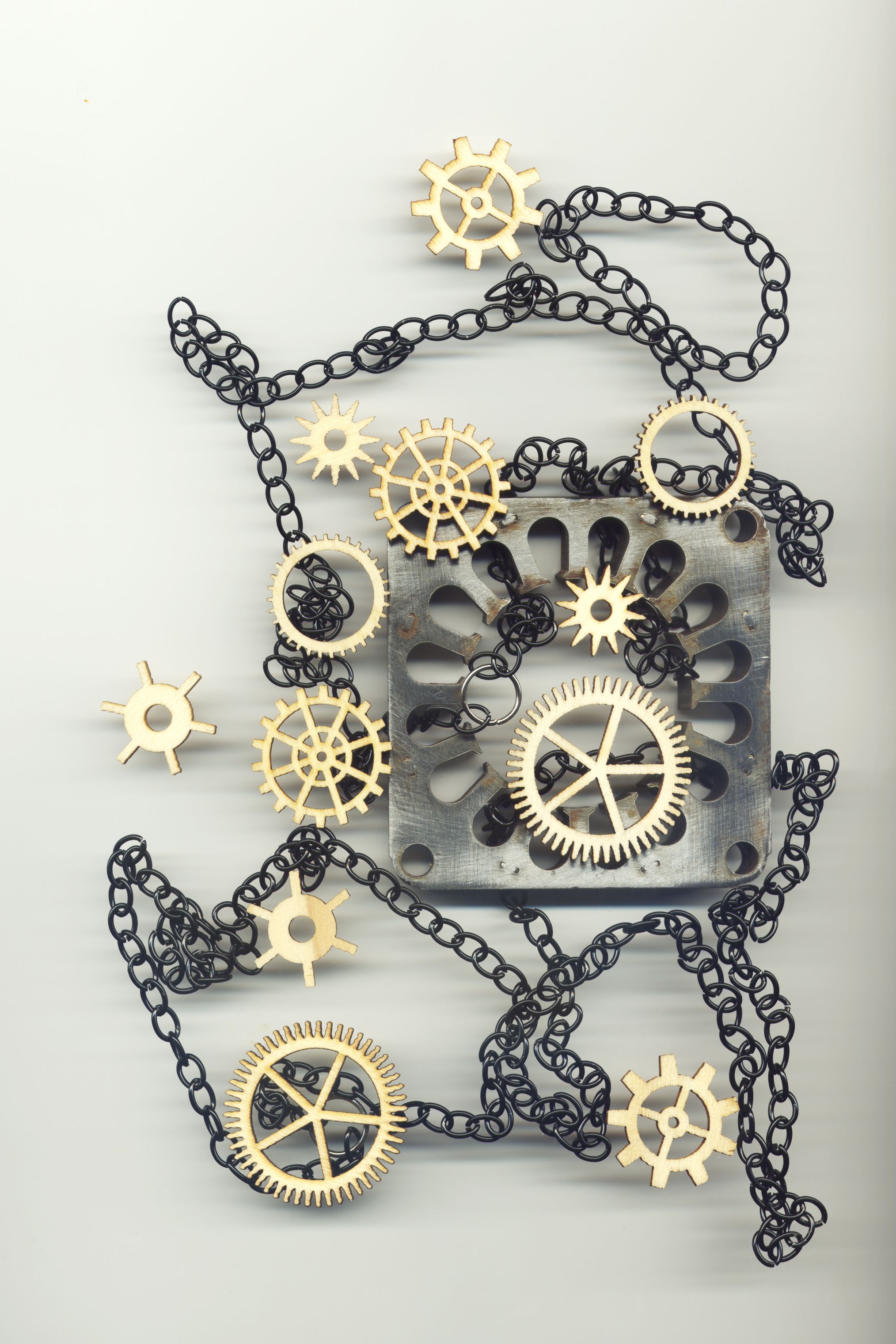 Intricate Gear and Chain Arrangement on Neutral Background · Free Stock ...