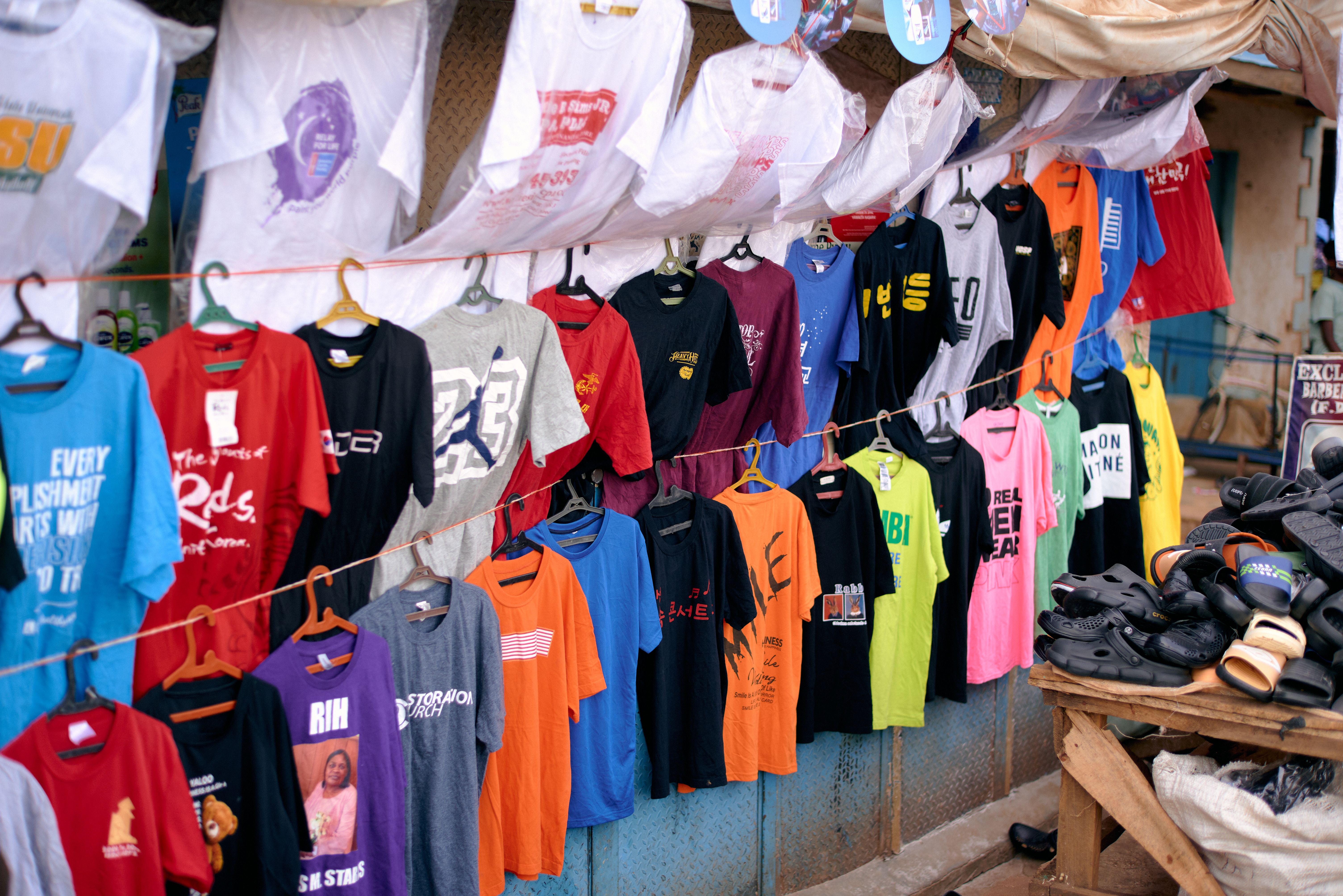 Colorful T-shirt Display at Jos Market in Nigeria · Free Stock Photo