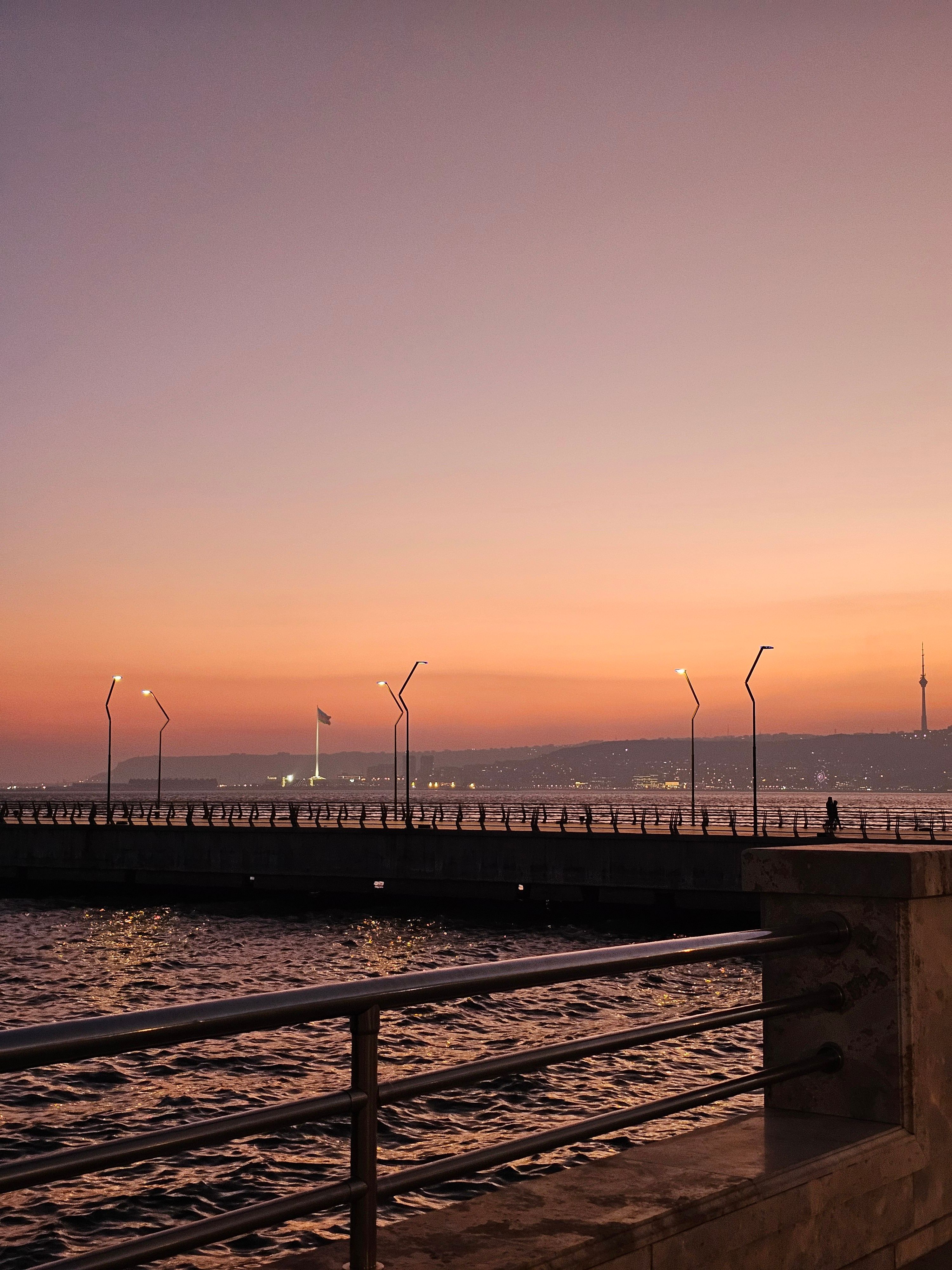 Scenic Sunset View Over Waterfront Pier · Free Stock Photo