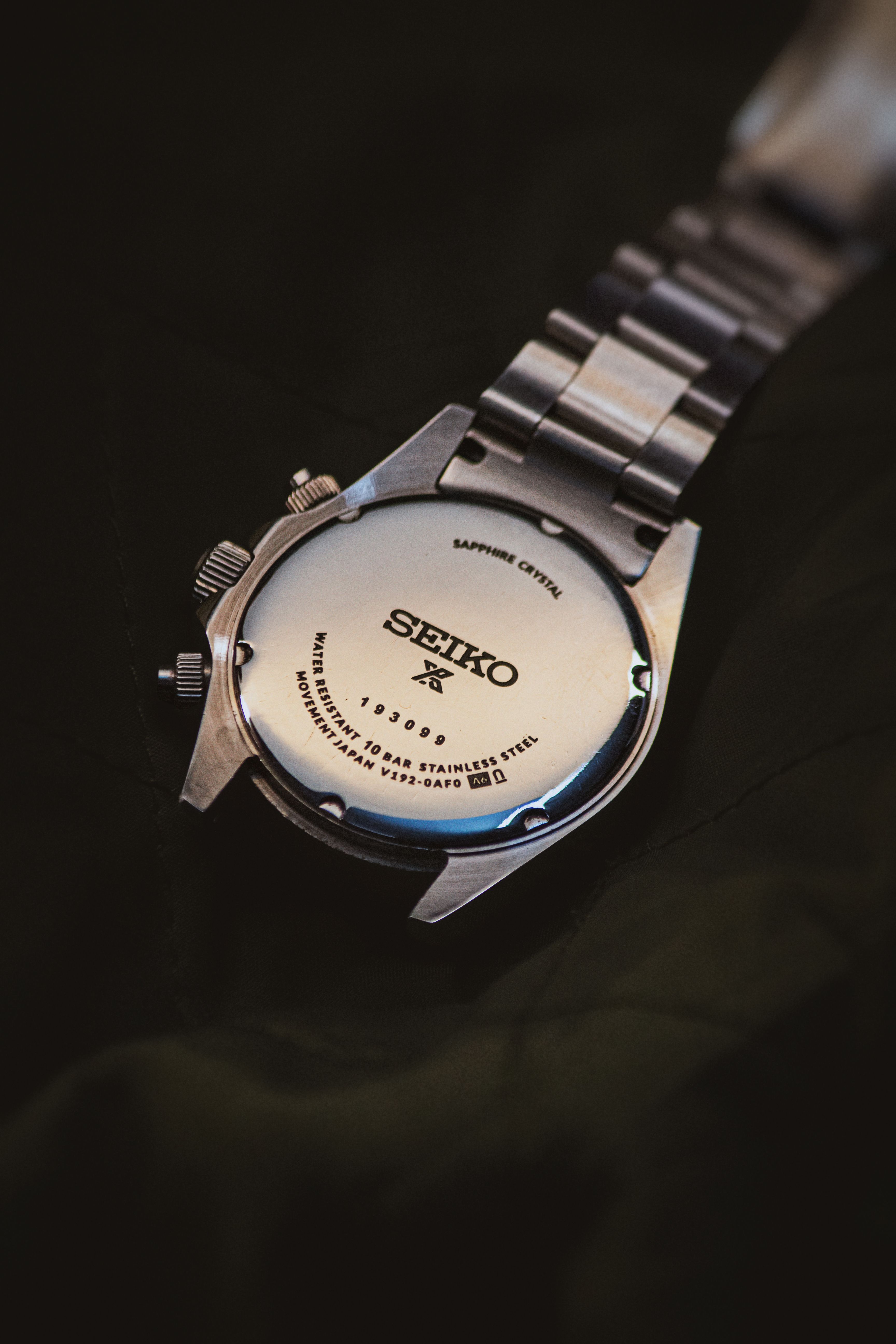 Close-Up of Seiko Watch Back with Steel Bracelet · Free Stock Photo