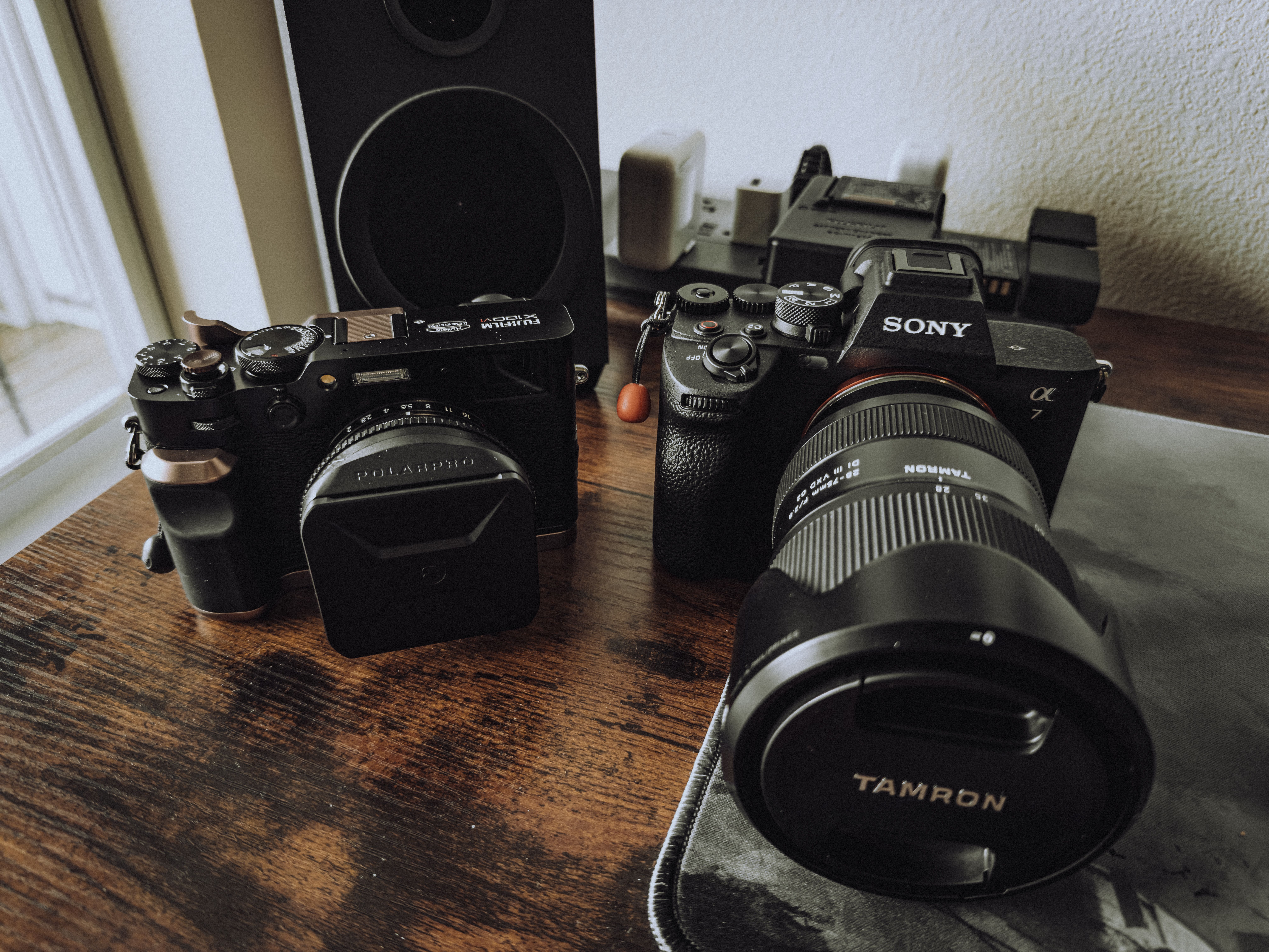 Professional Camera Equipment on Wooden Desk Setup · Free Stock Photo
