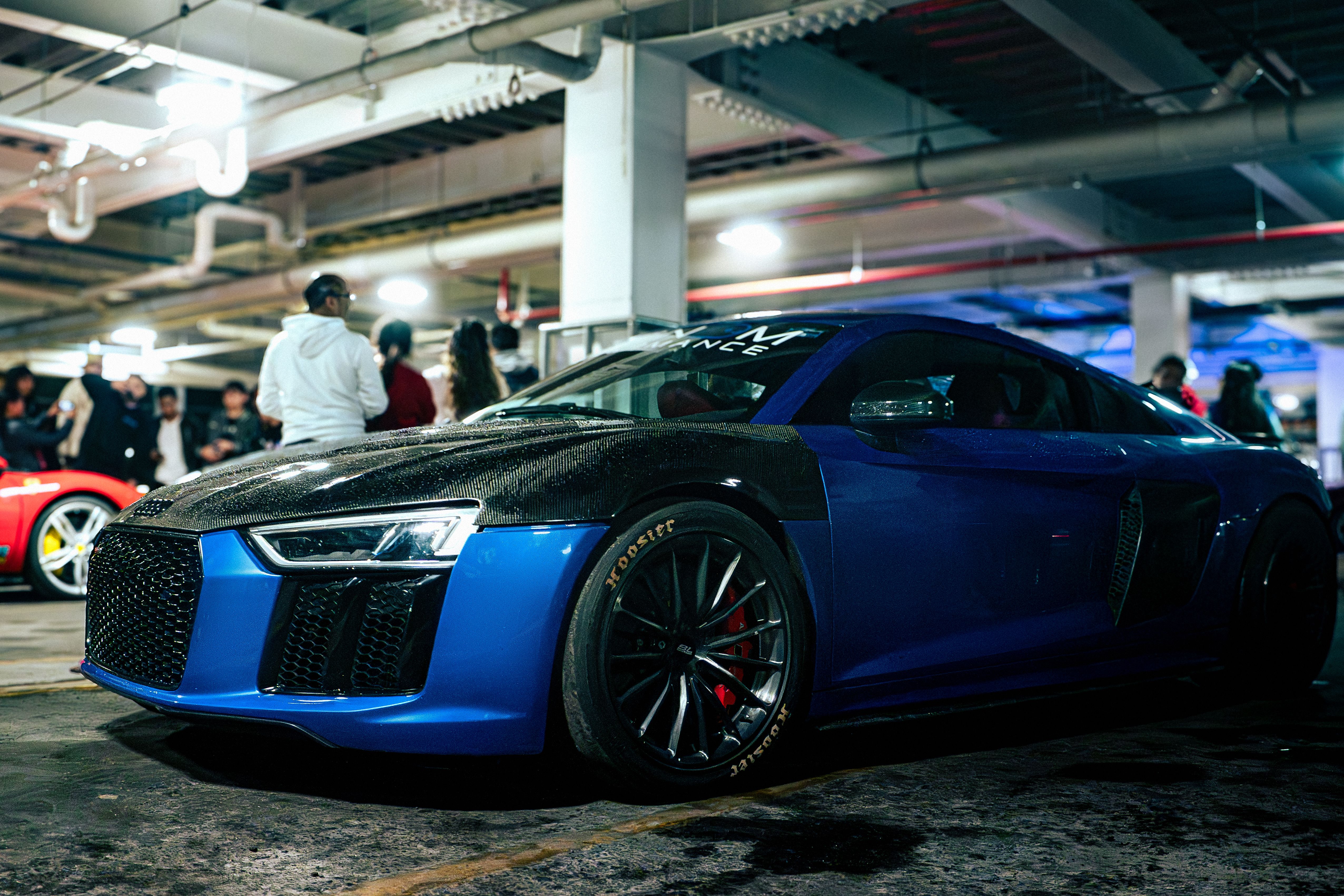 Blue Supercar in Underground Parking Event · Free Stock Photo