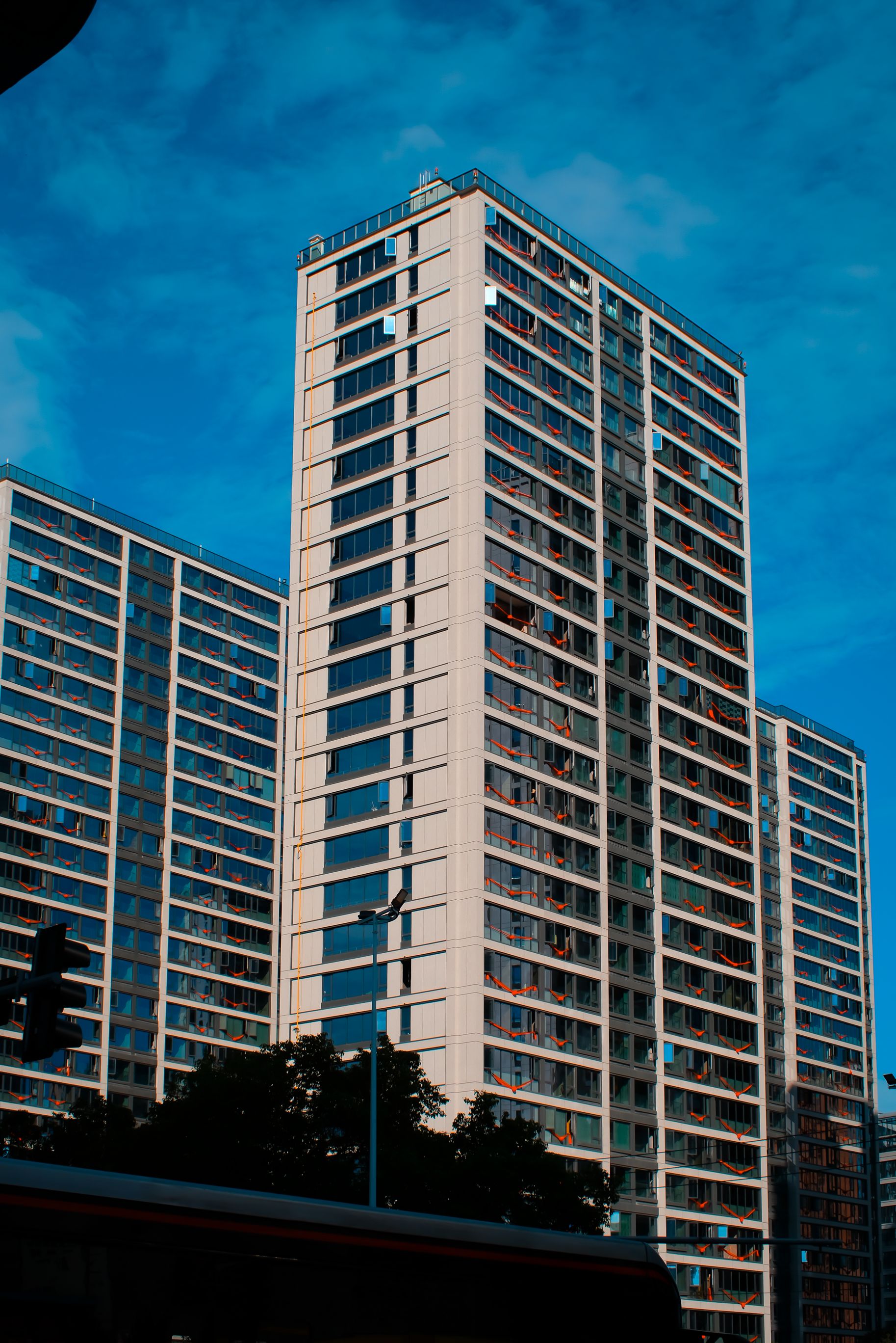 Modern High-Rise Buildings Against Blue Sky · Free Stock Photo