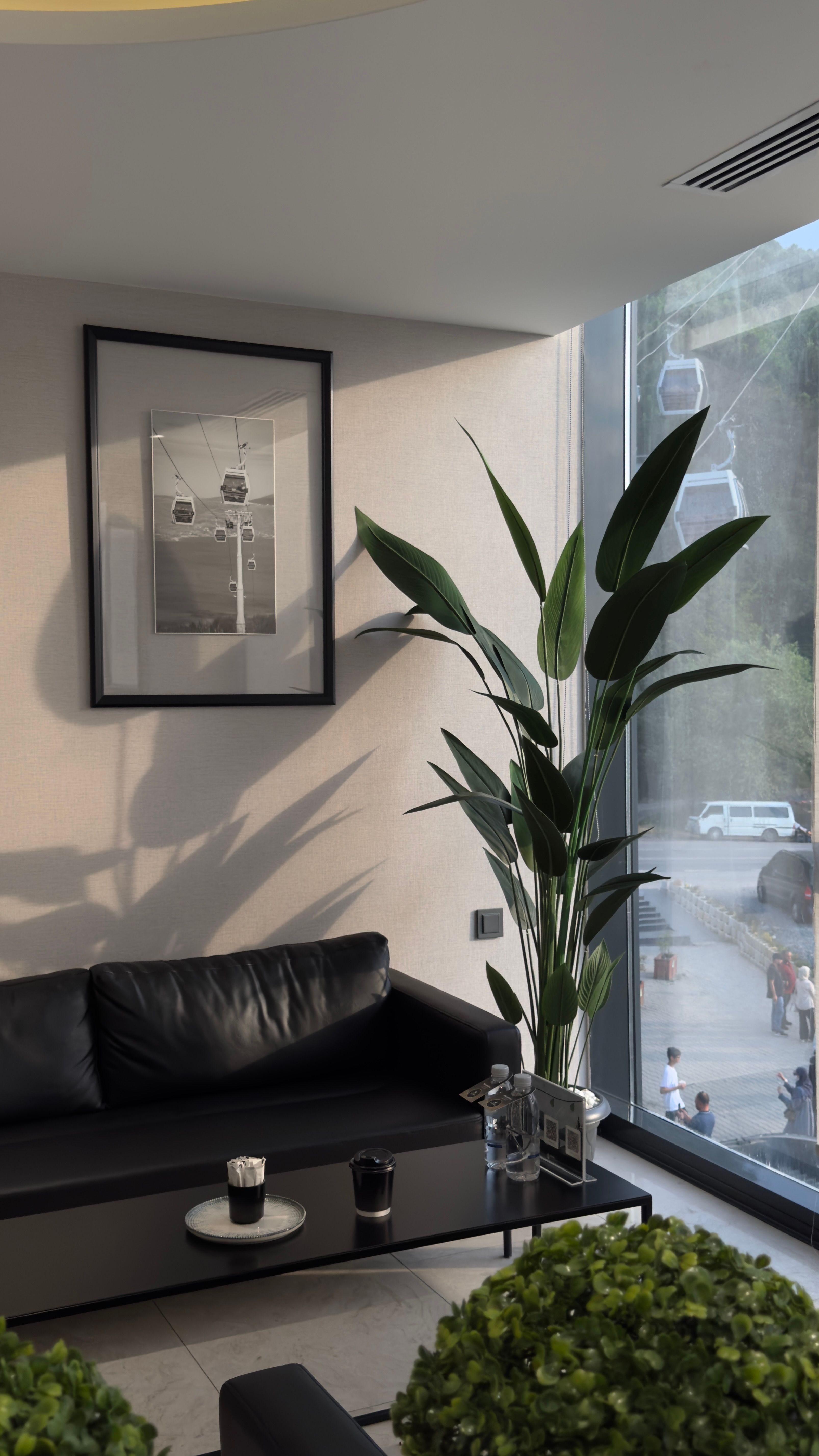 Modern Lounge with Large Window and Minimalist Decor · Free Stock Photo