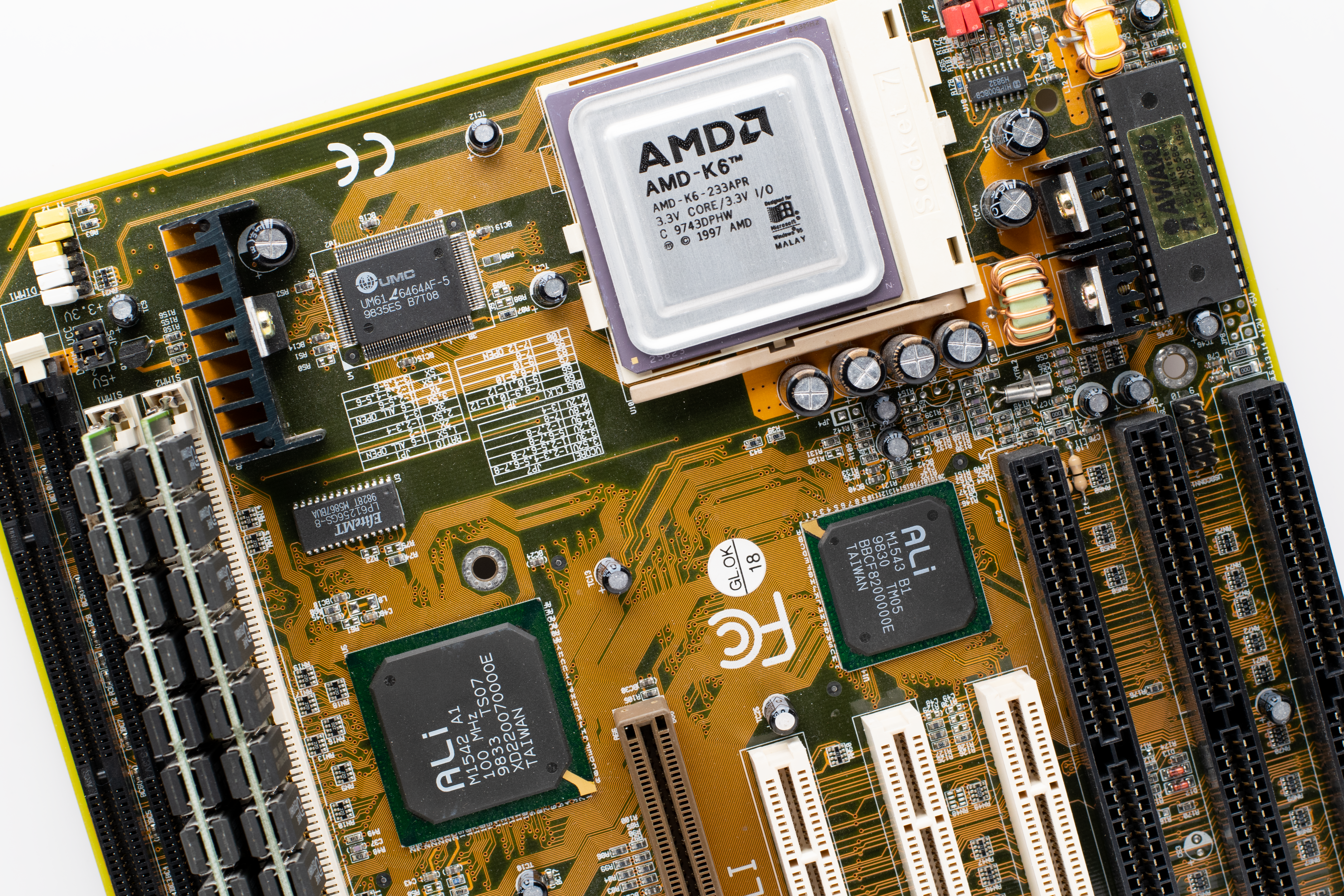 Vintage AMD K6 CPU on Motherboard · Free Stock Photo