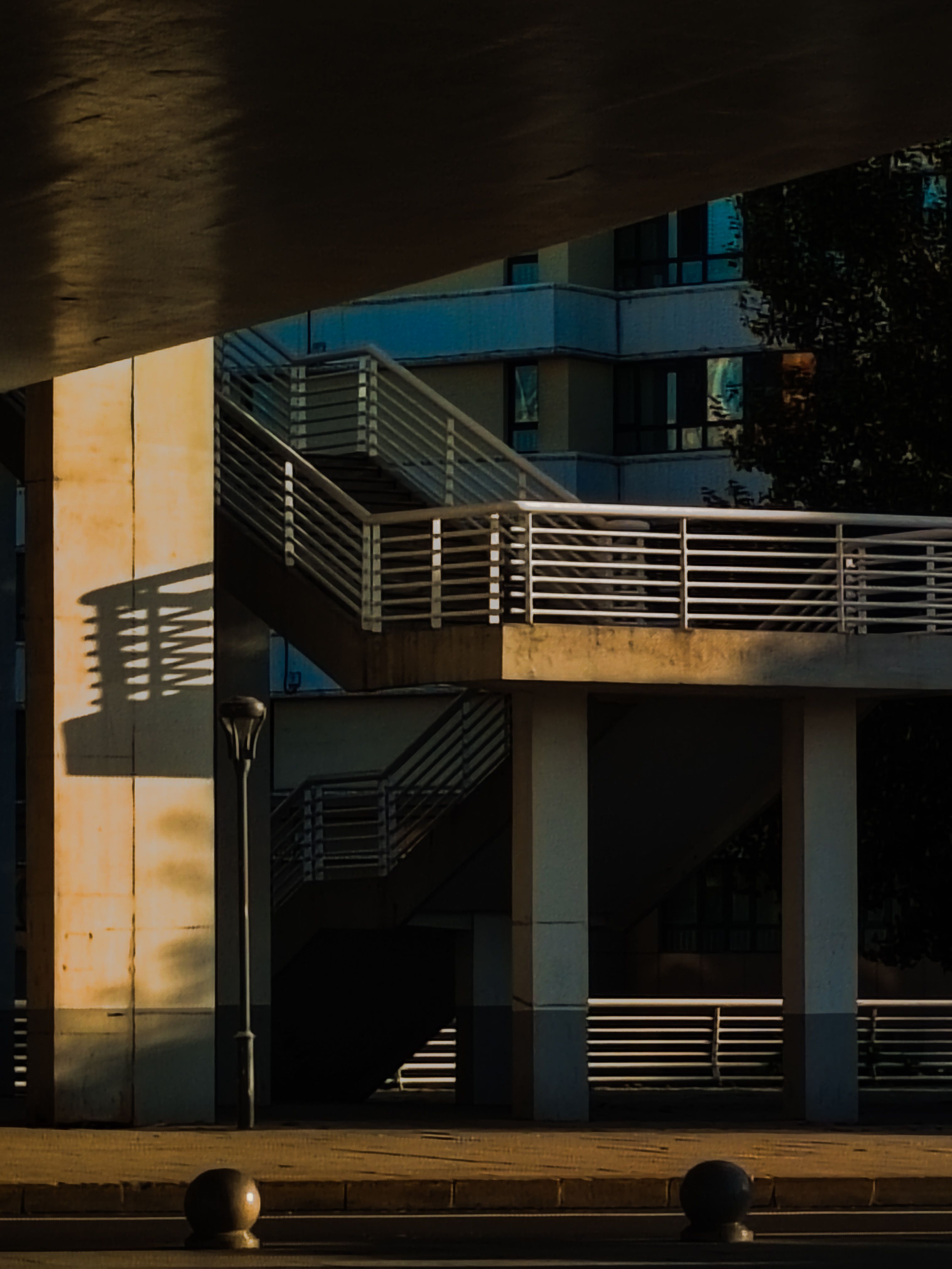 Modern Urban Staircase with Geometric Shadows · Free Stock Photo