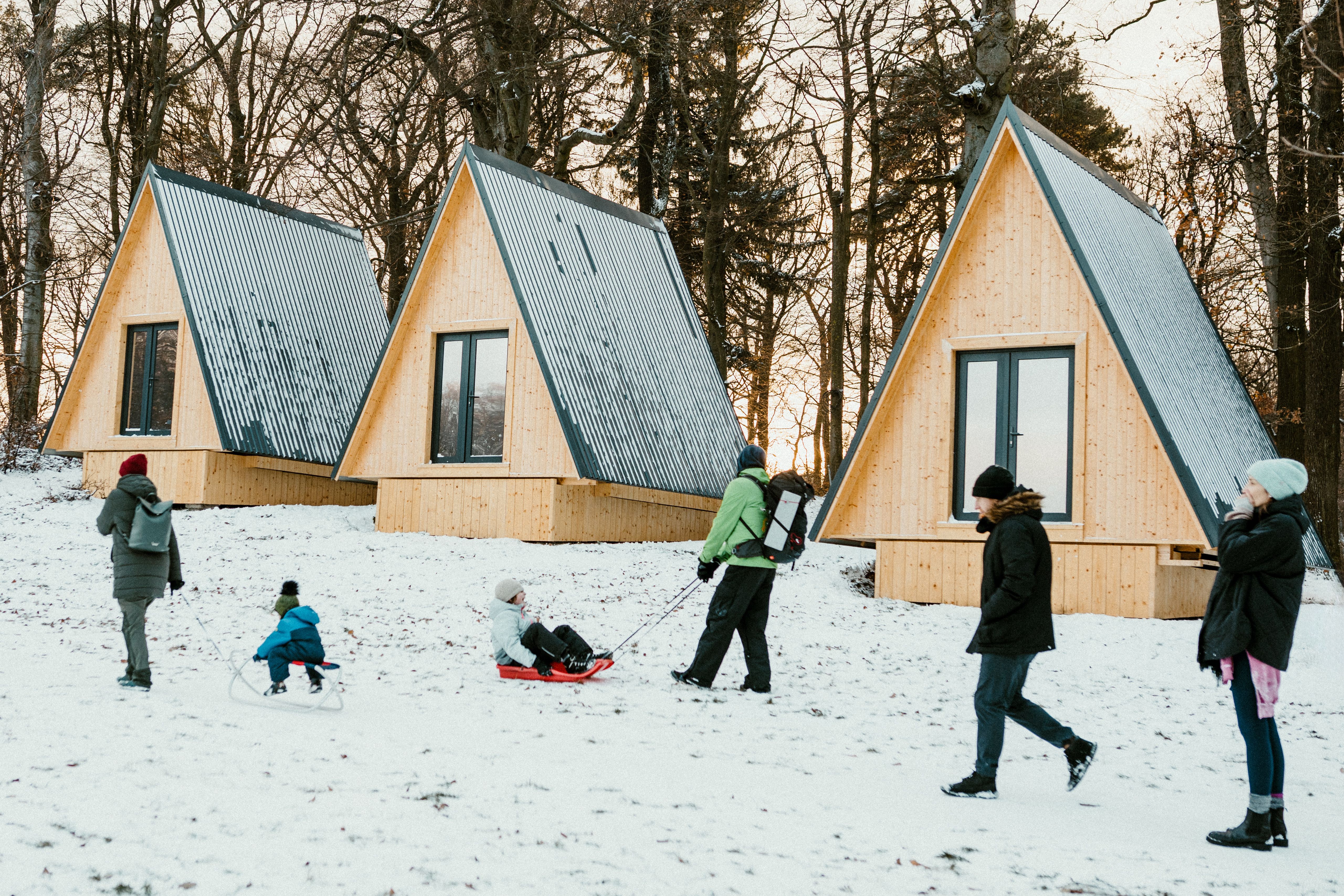 Winter Family Fun in Snowy Cabin Retreat · Free Stock Photo