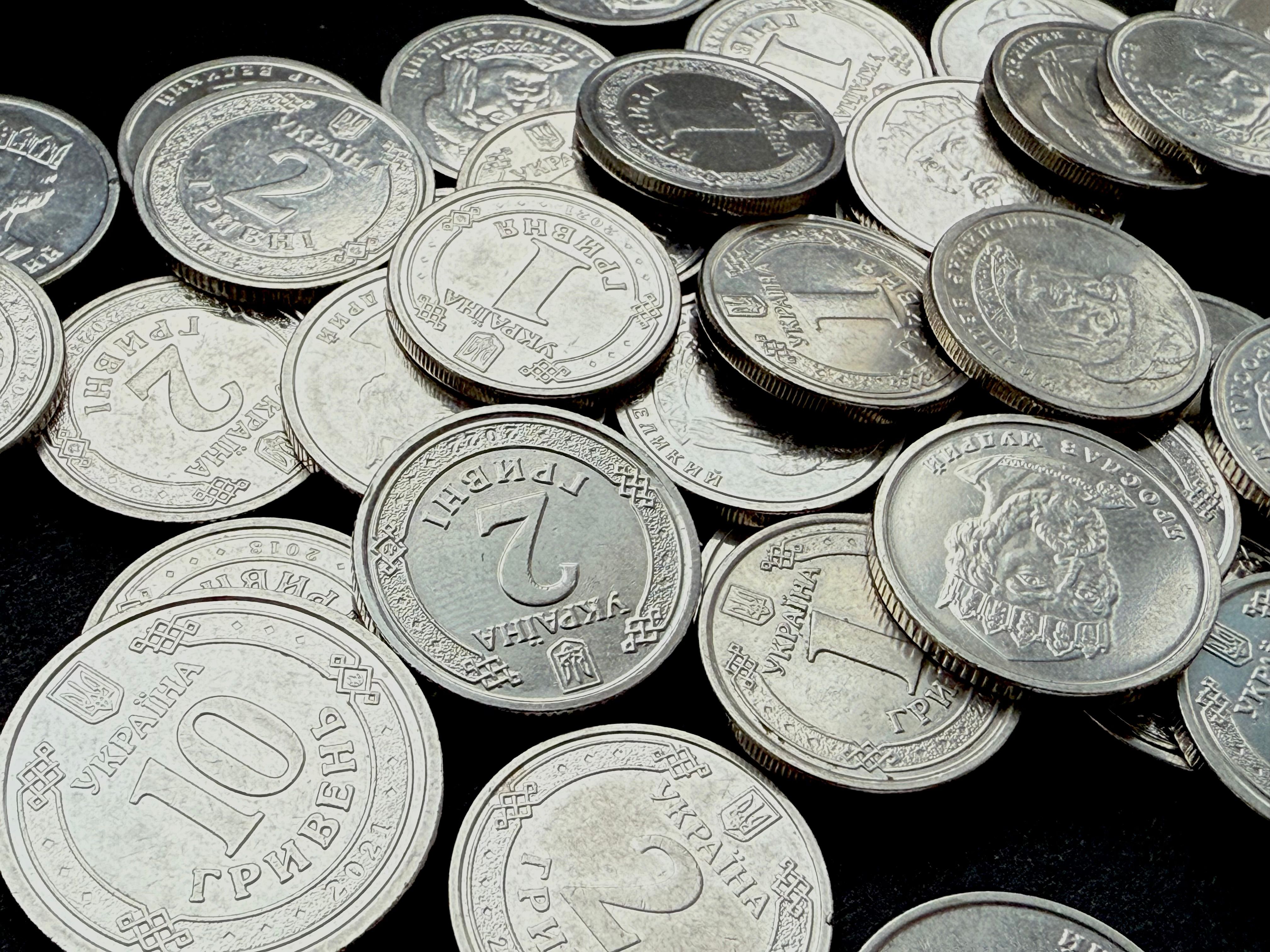 Ukrainian Hryvnia Coins on Dark Background · Free Stock Photo