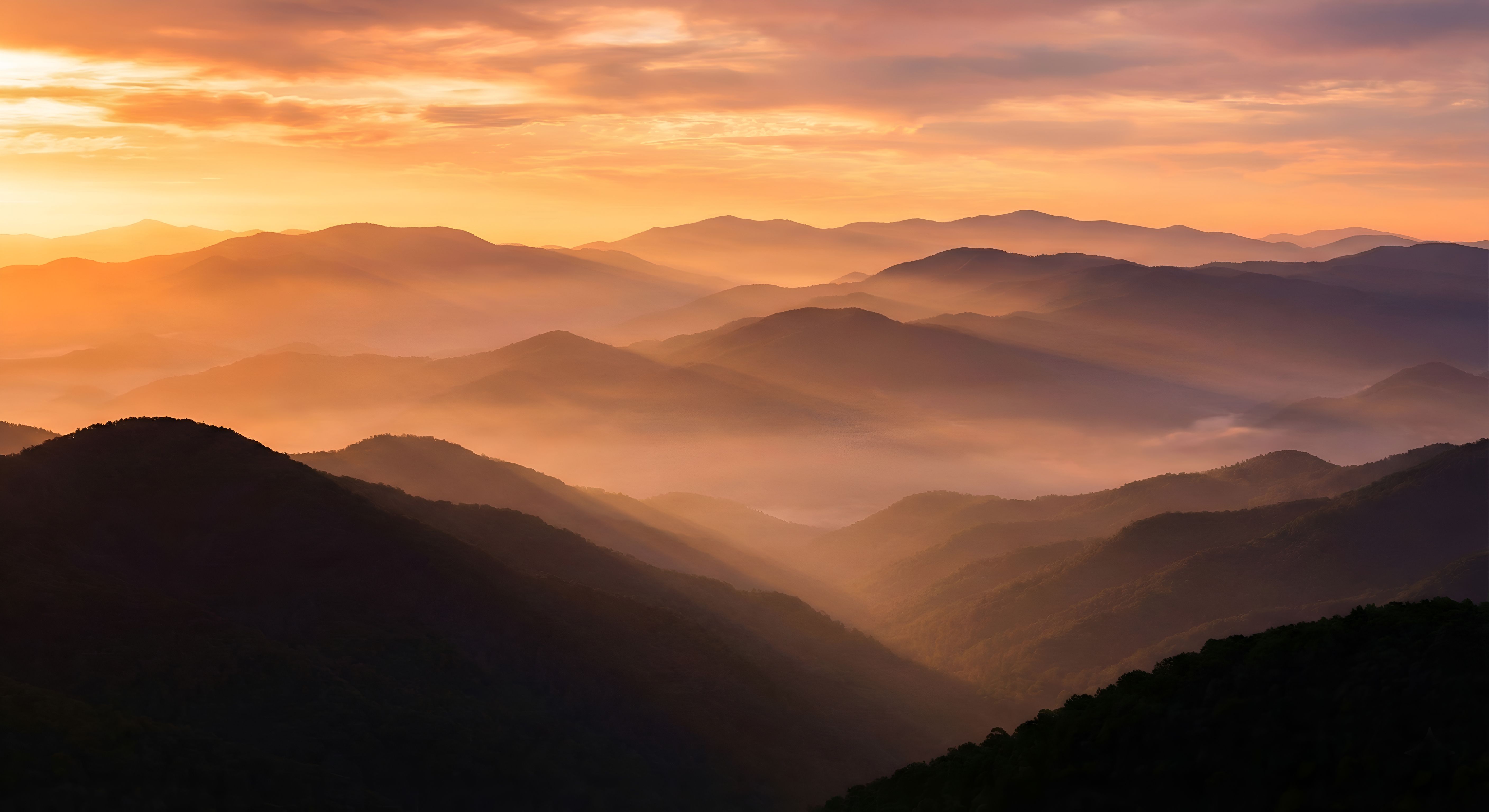Majestic Mountain Ranges at Sunset · Free Stock Photo