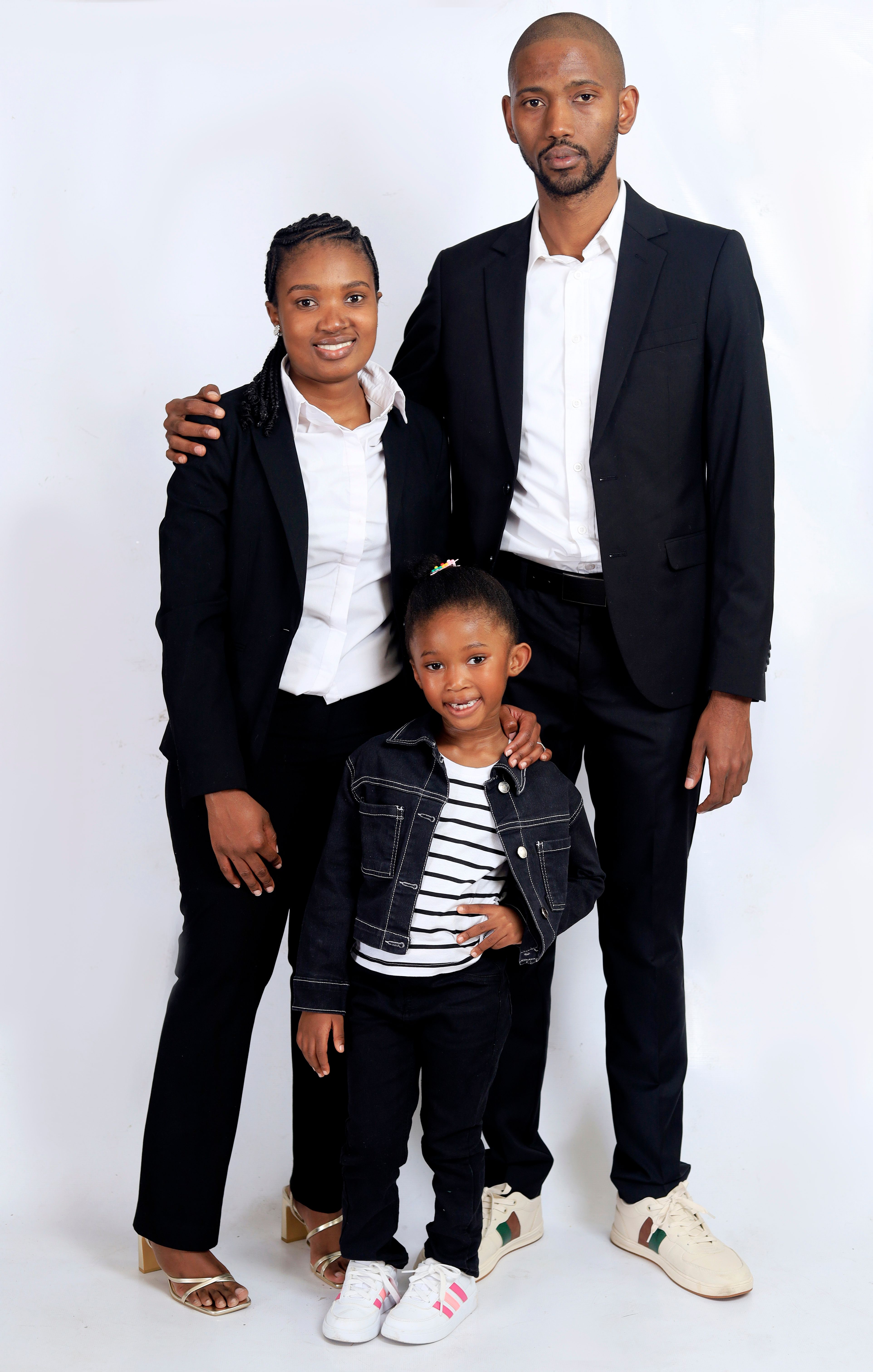 Happy family portrait in formal attire · Free Stock Photo