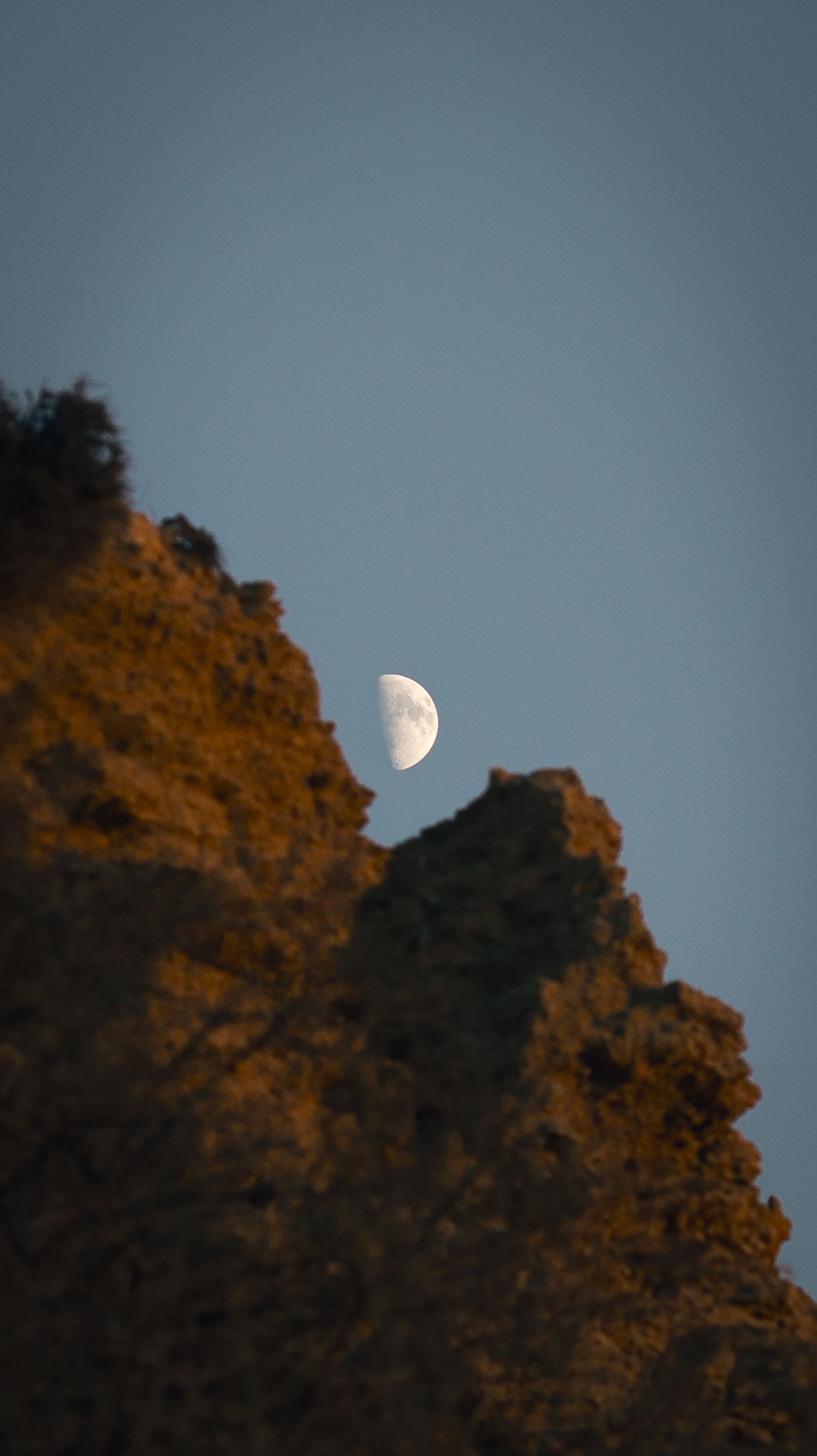 Moon Rising Over Dramatic Rocky Cliffs · Free Stock Photo