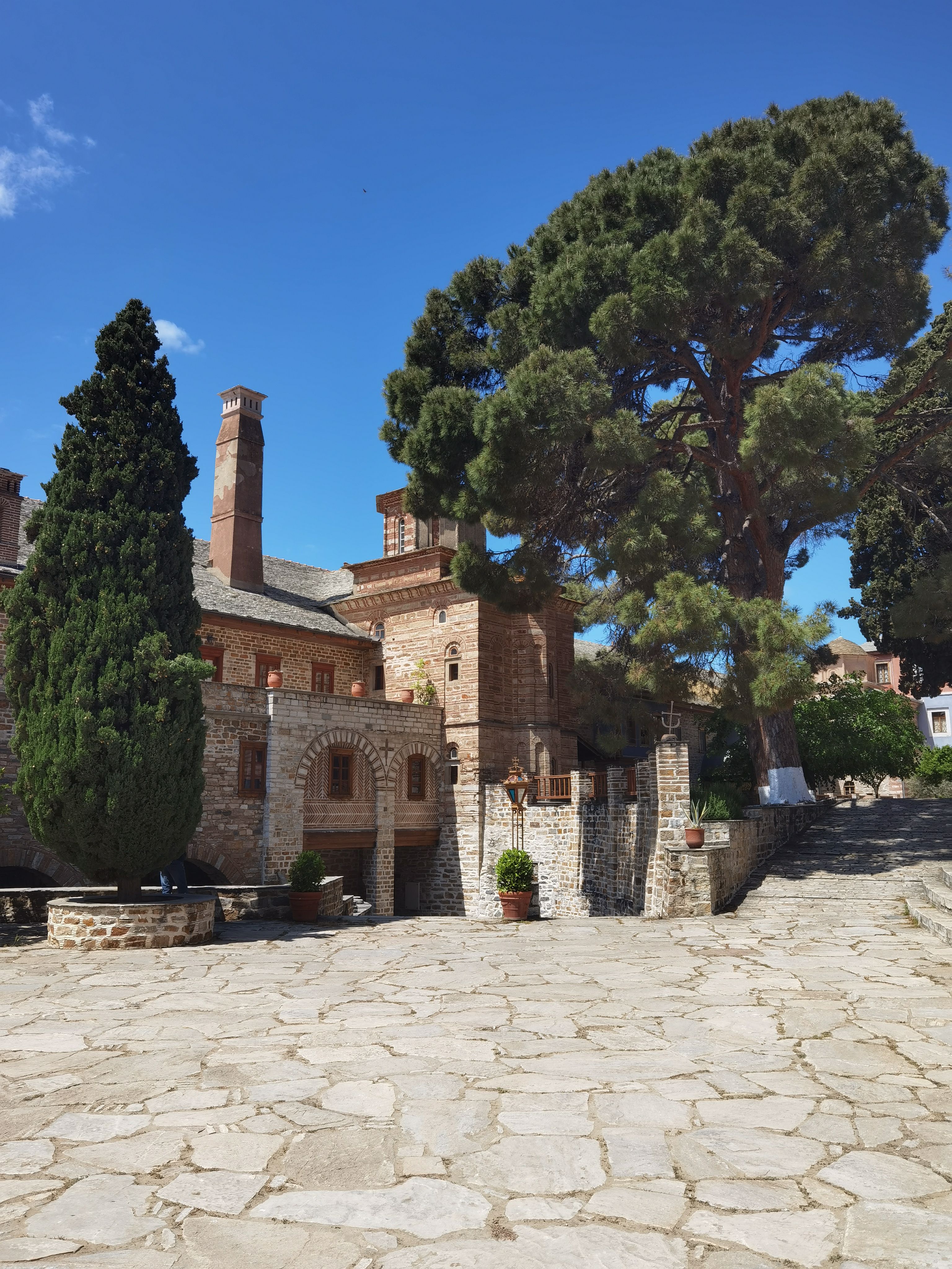 Historic Monastery Courtyard with Stone Path · Free Stock Photo