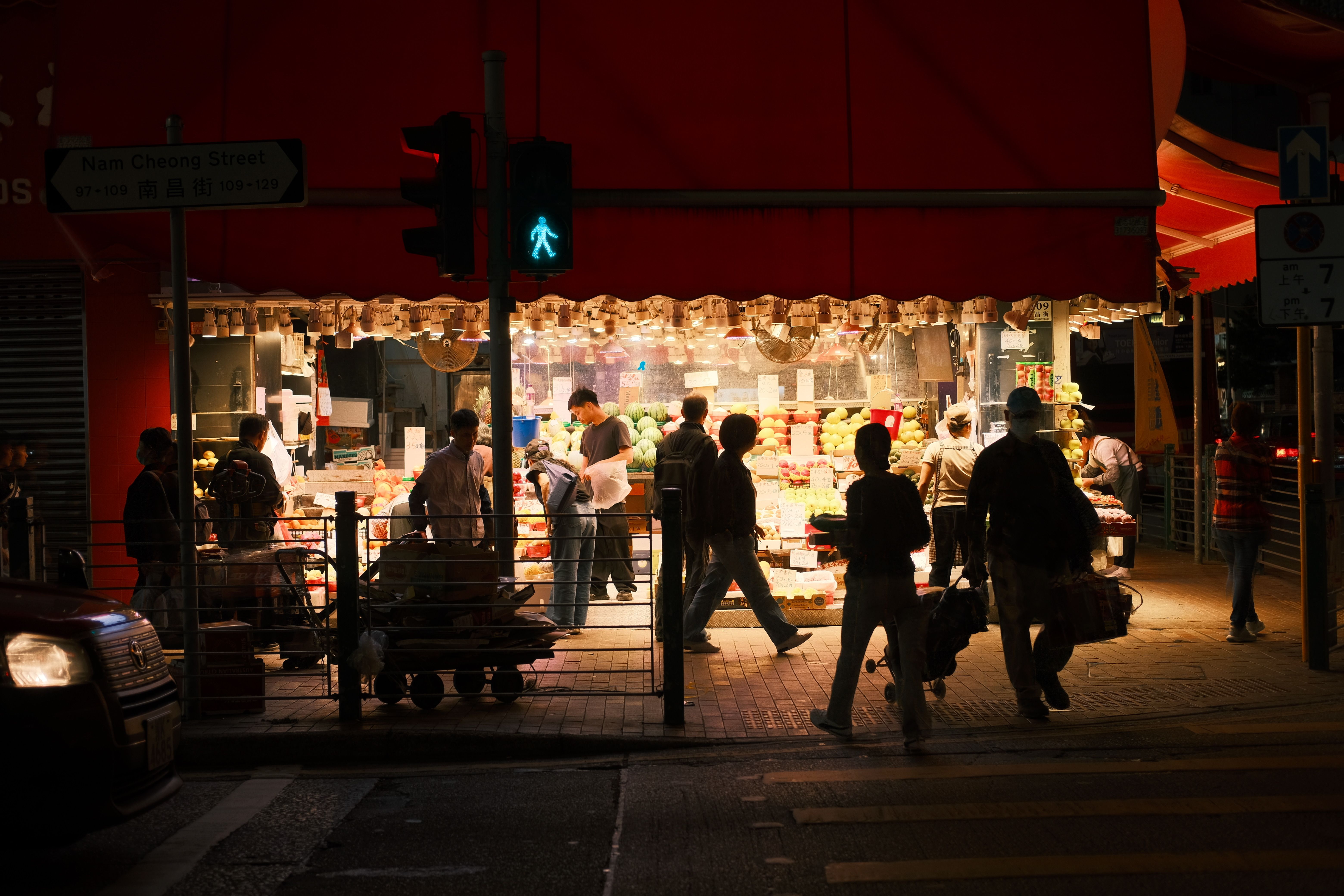 Bustling Night Market Scene in Hong Kong · Free Stock Photo