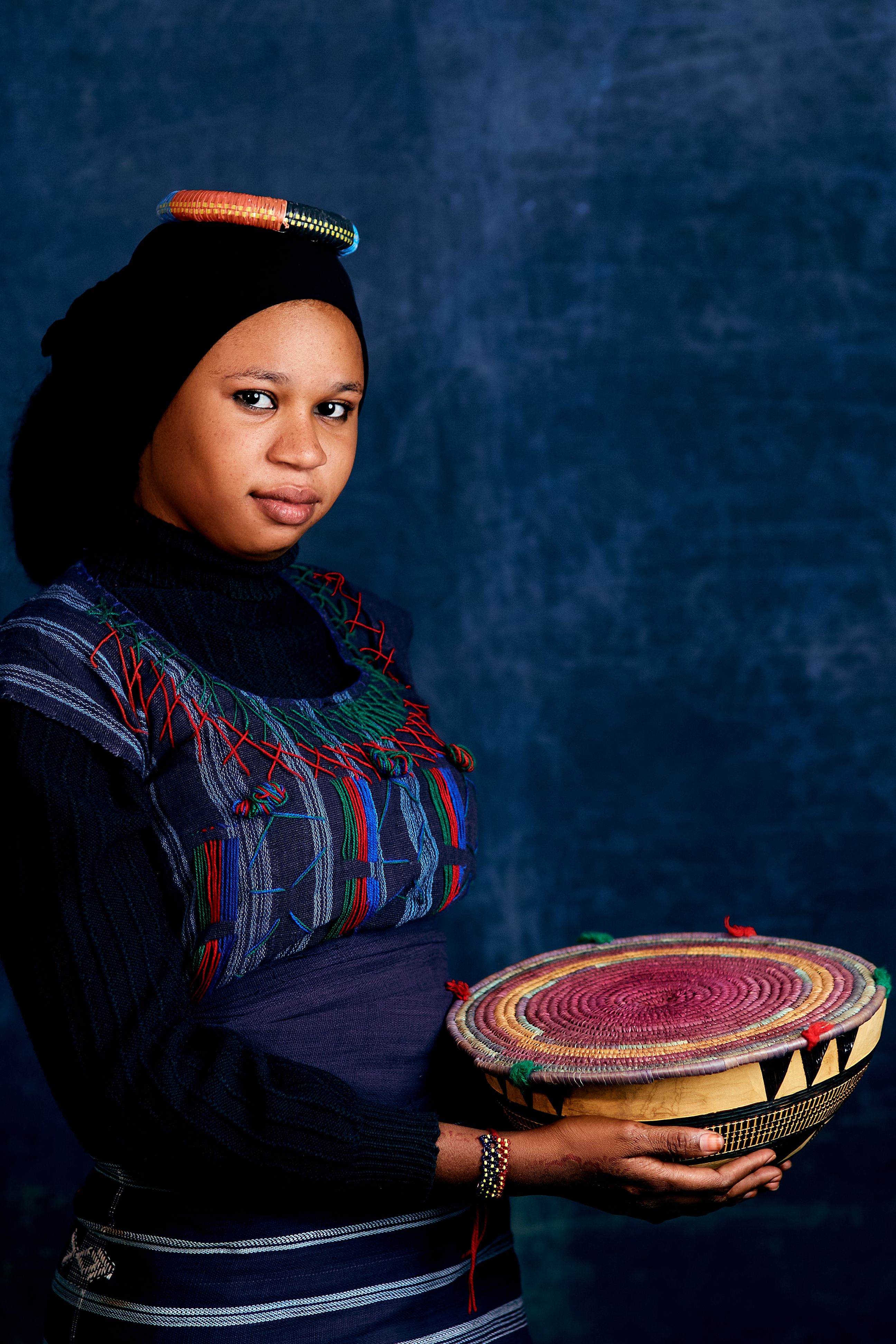 Portrait of Woman with African Woven Basket · Free Stock Photo