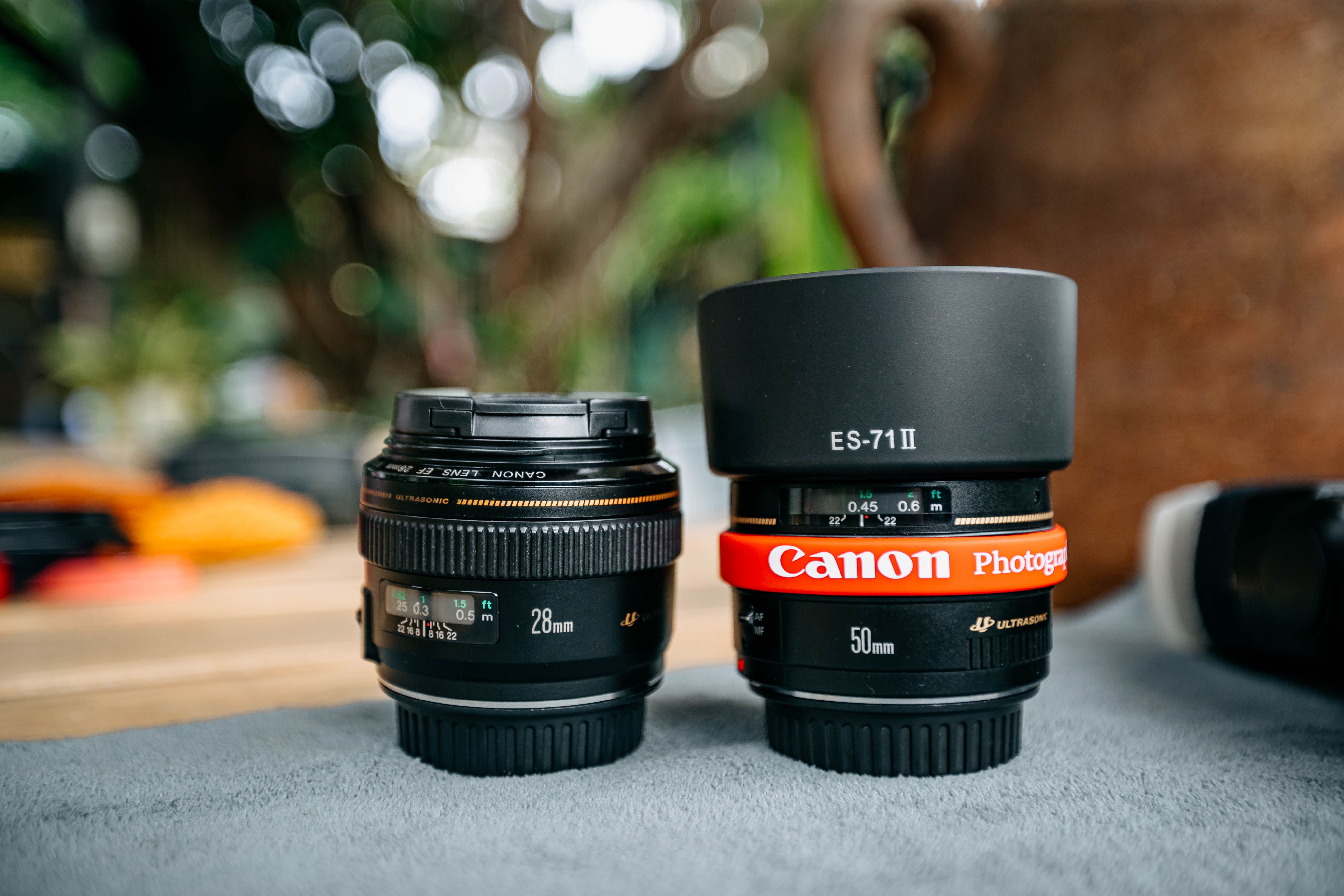 Close-up of Two Camera Lenses on a Table · Free Stock Photo