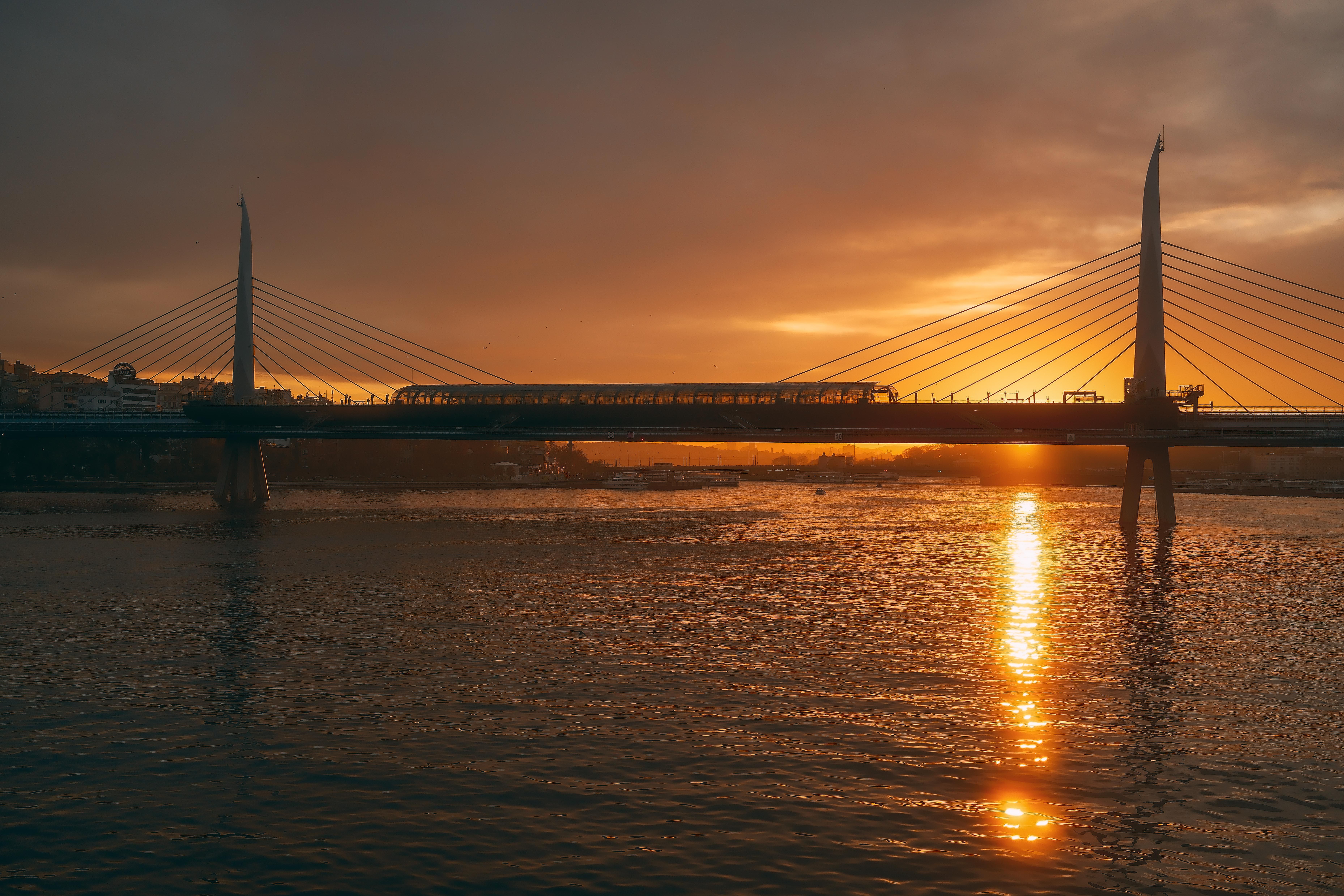Golden Sunset Over Iconic City Bridge · Free Stock Photo