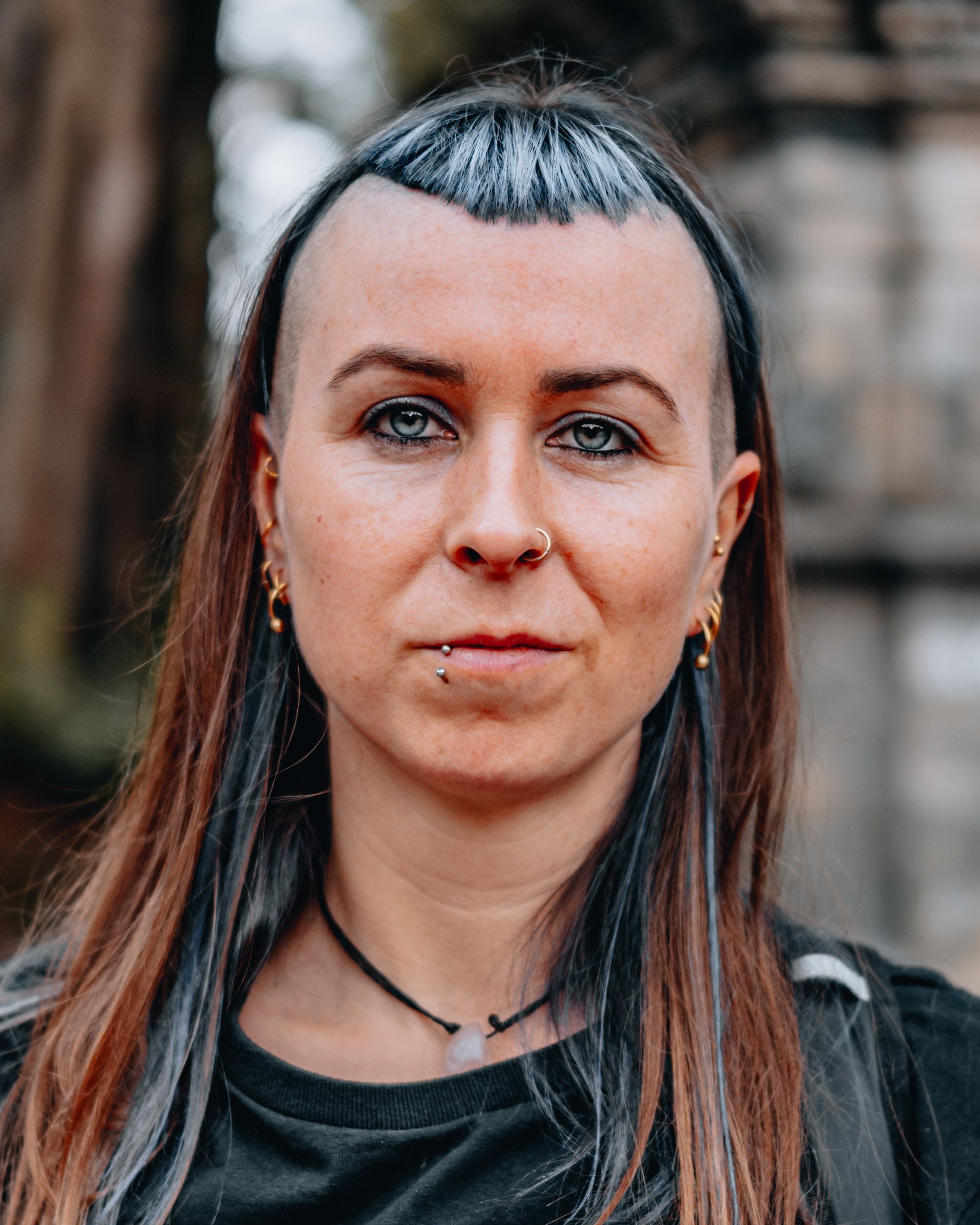 Portrait of a Trendy Woman with Unique Hairstyle · Free Stock Photo