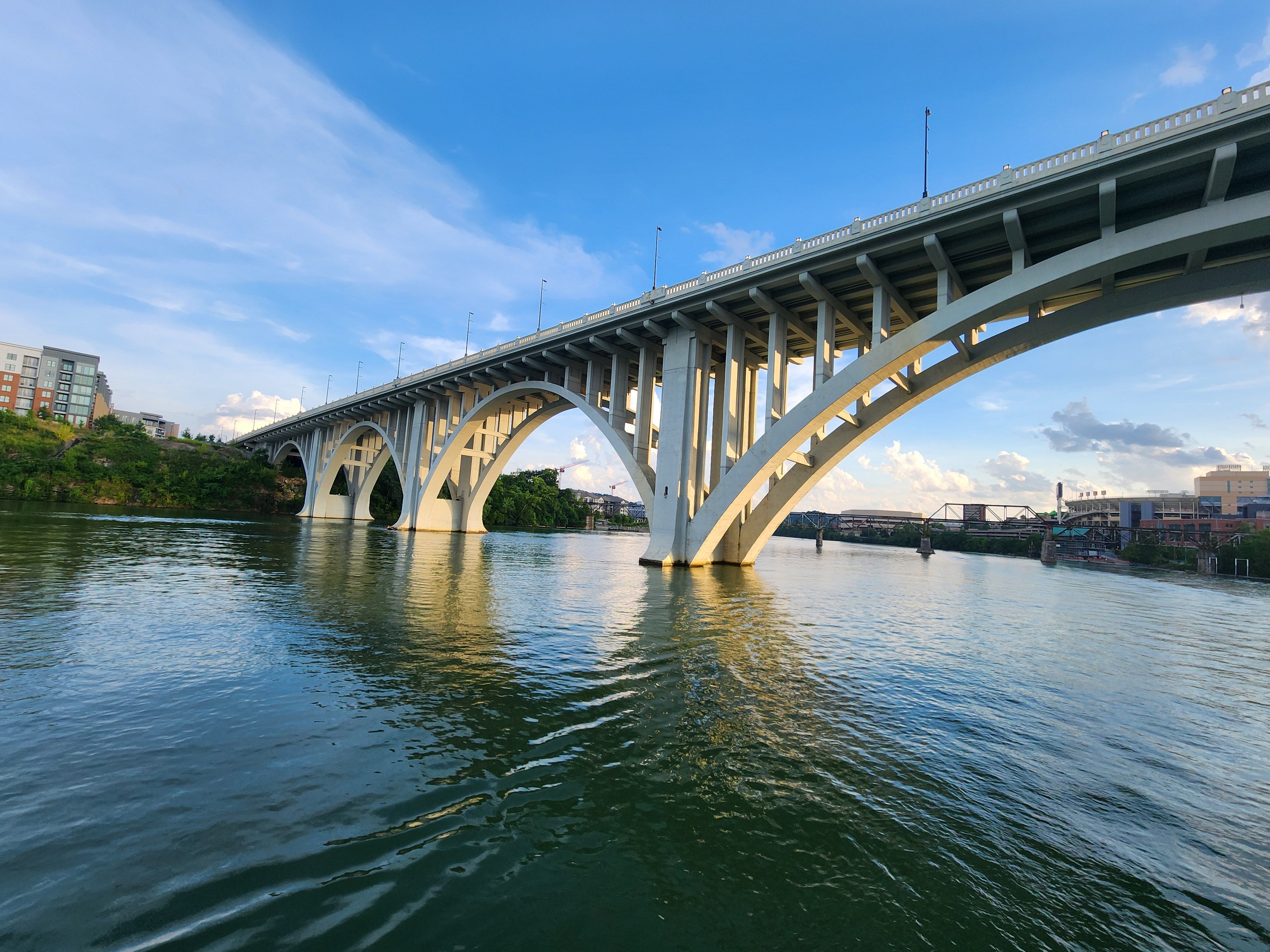 Scenic View of Bridge Over Tranquil Waterway · Free Stock Photo
