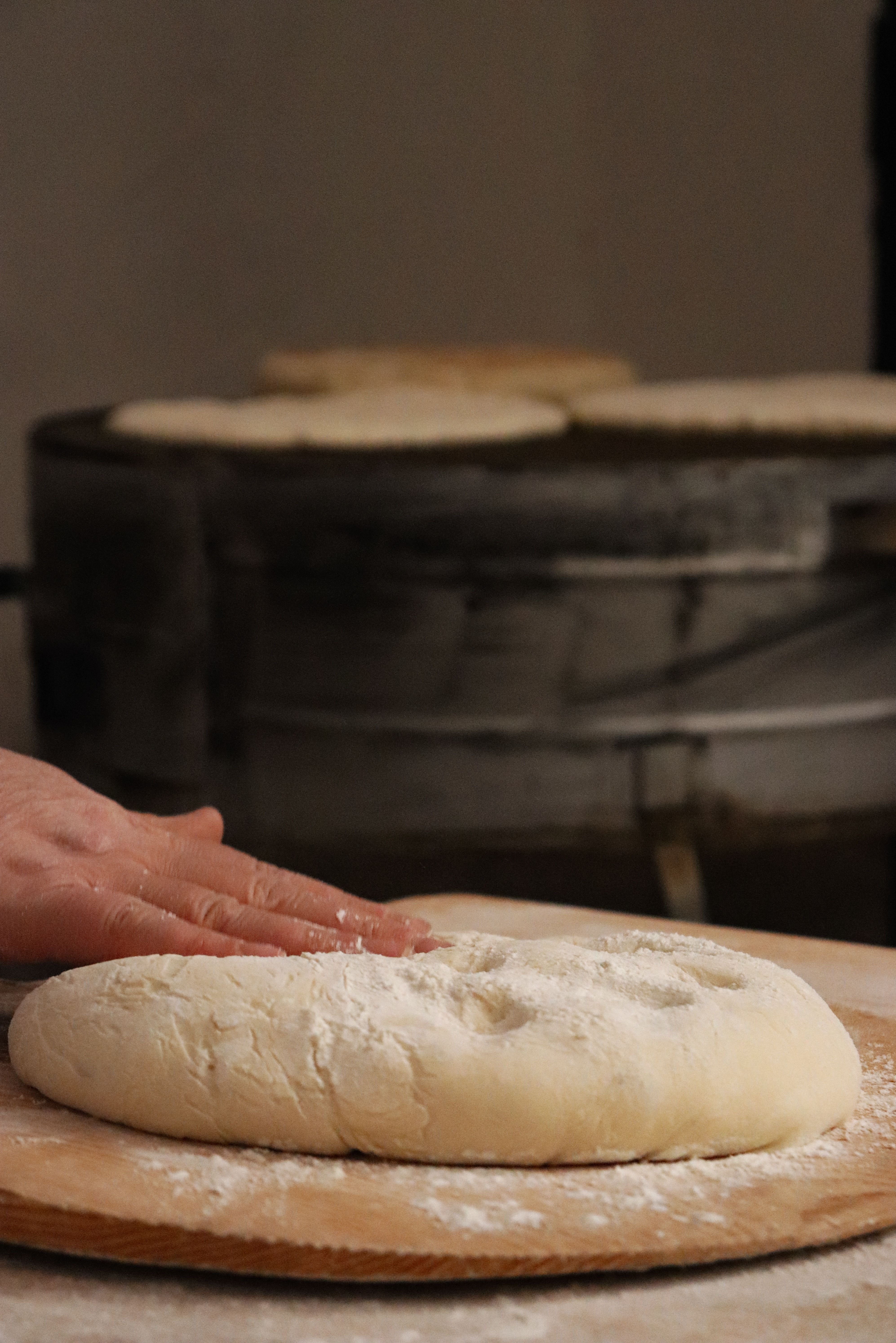 Close-Up of Dough Preparation in Bakery · Free Stock Photo