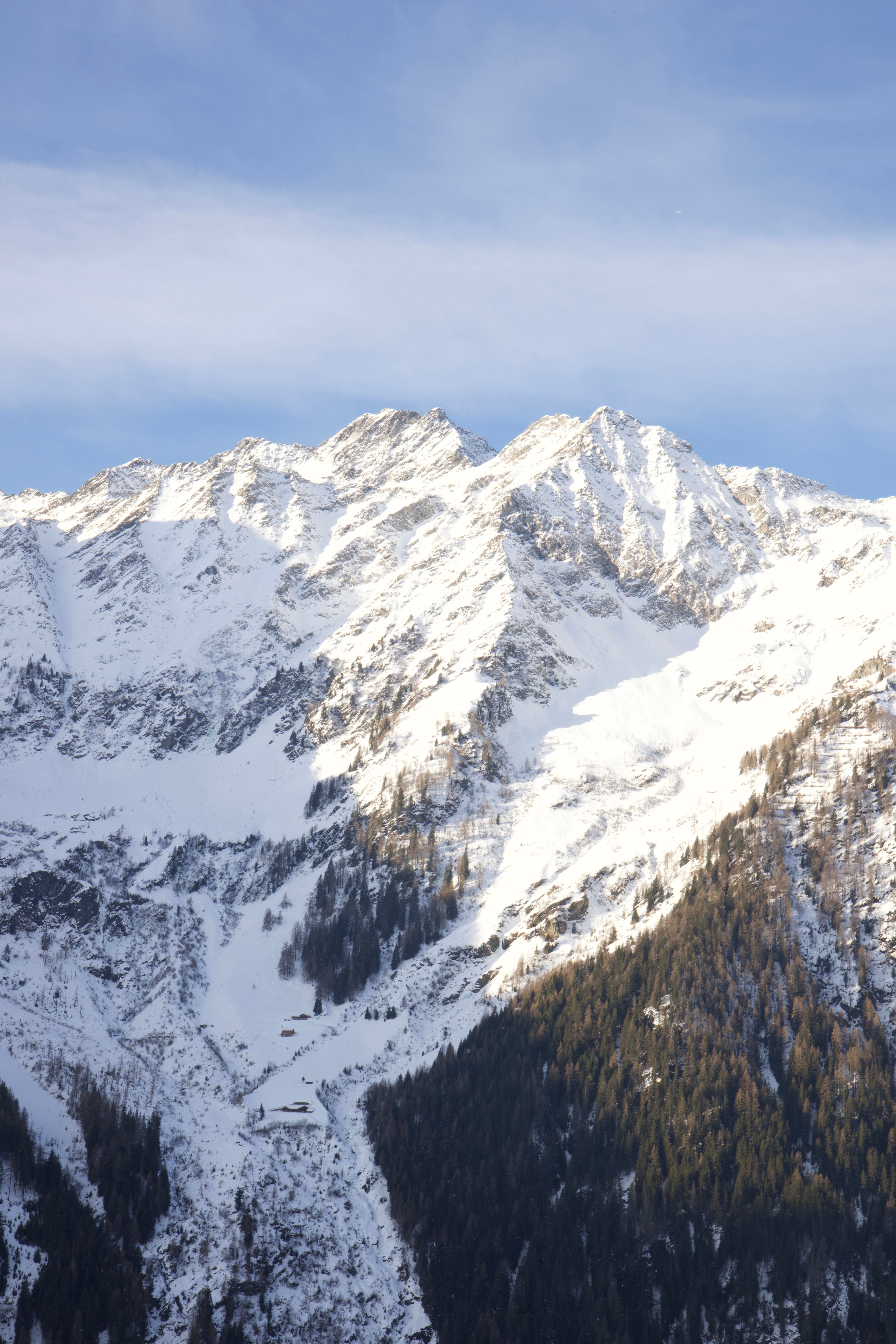 Snow-Capped Mountain Peaks Under Clear Blue Sky · Free Stock Photo