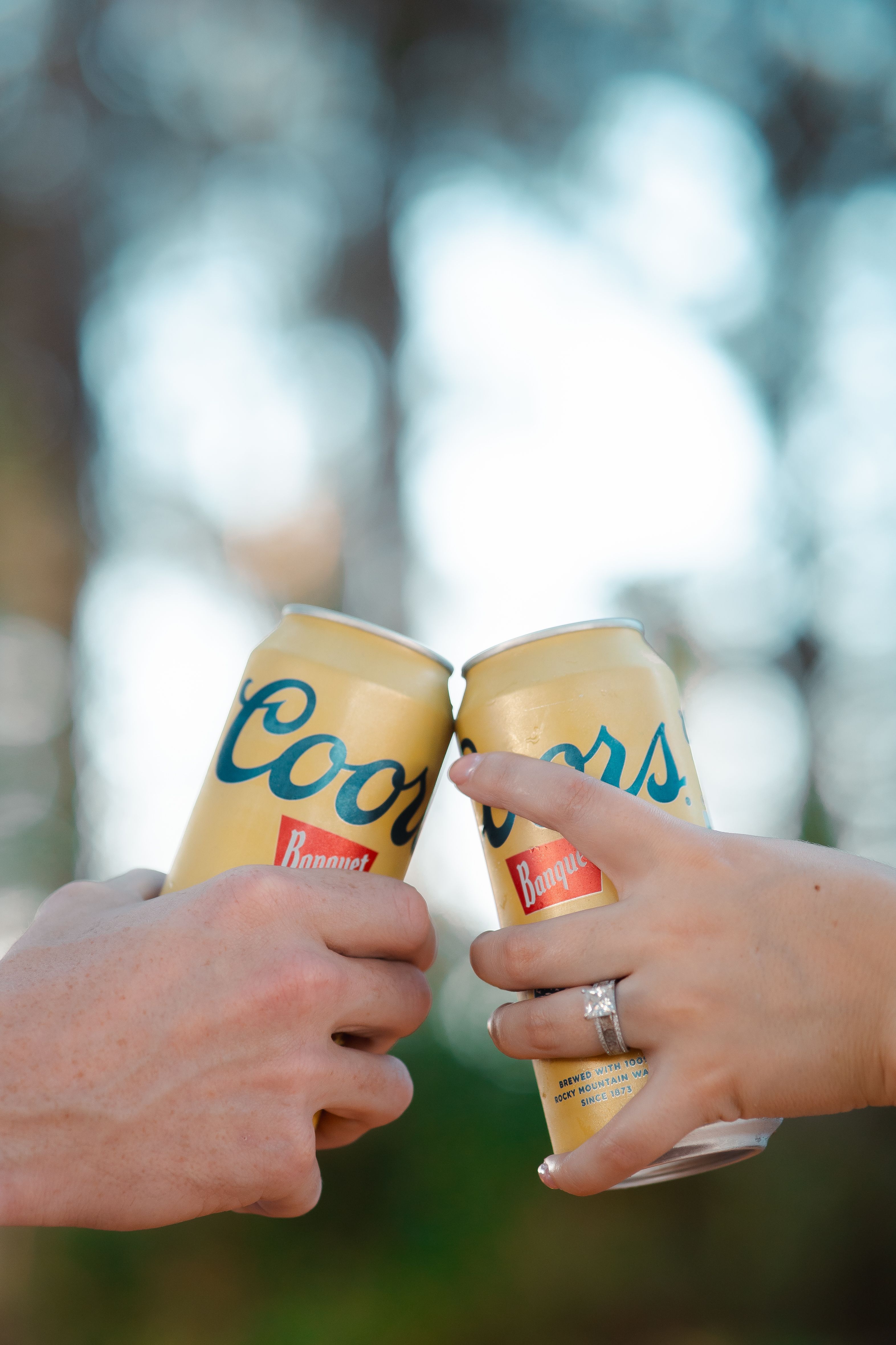 Celebration with Beer Cans Outdoors · Free Stock Photo