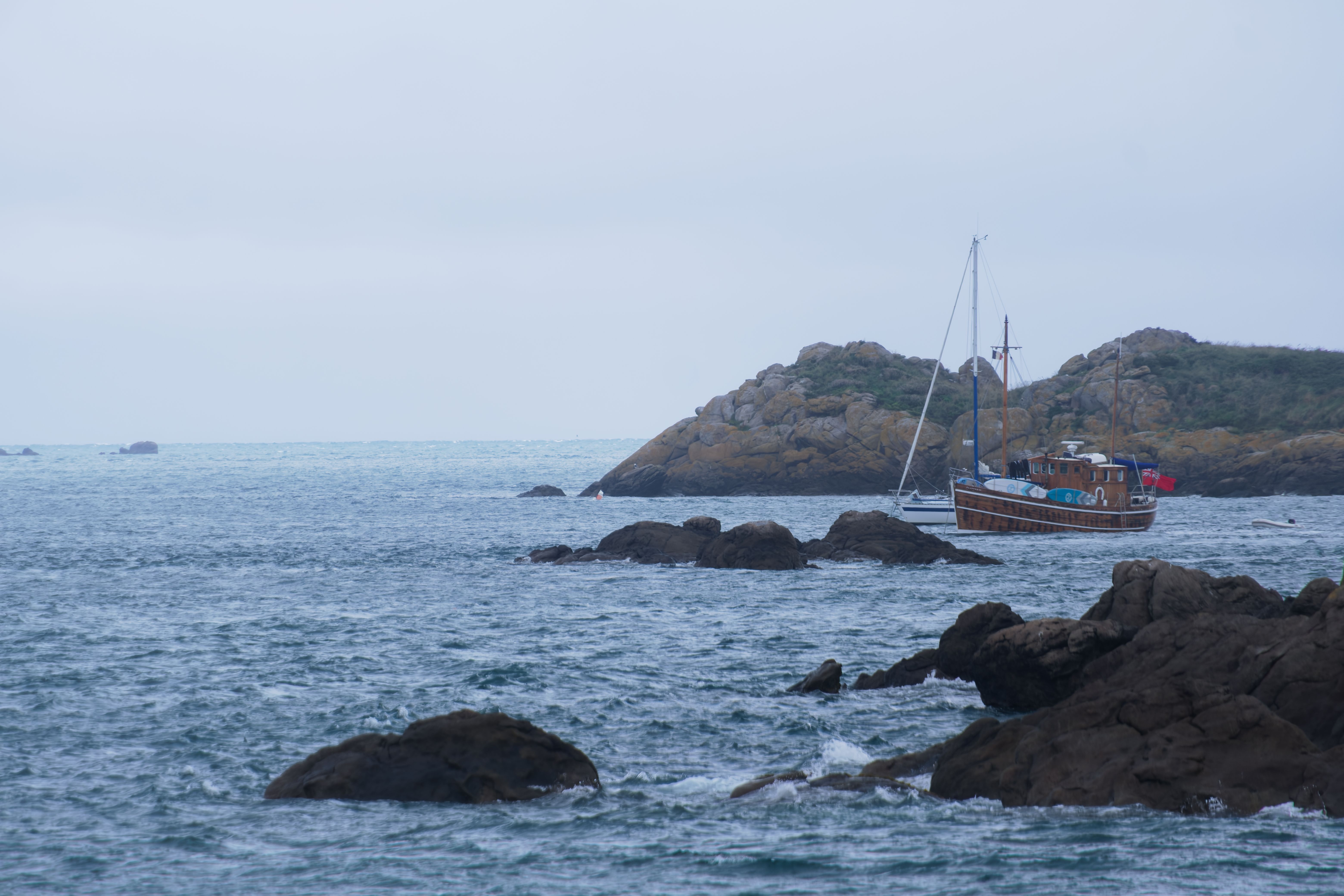 Scenic Boat View Near Rocky French Coastline · Free Stock Photo