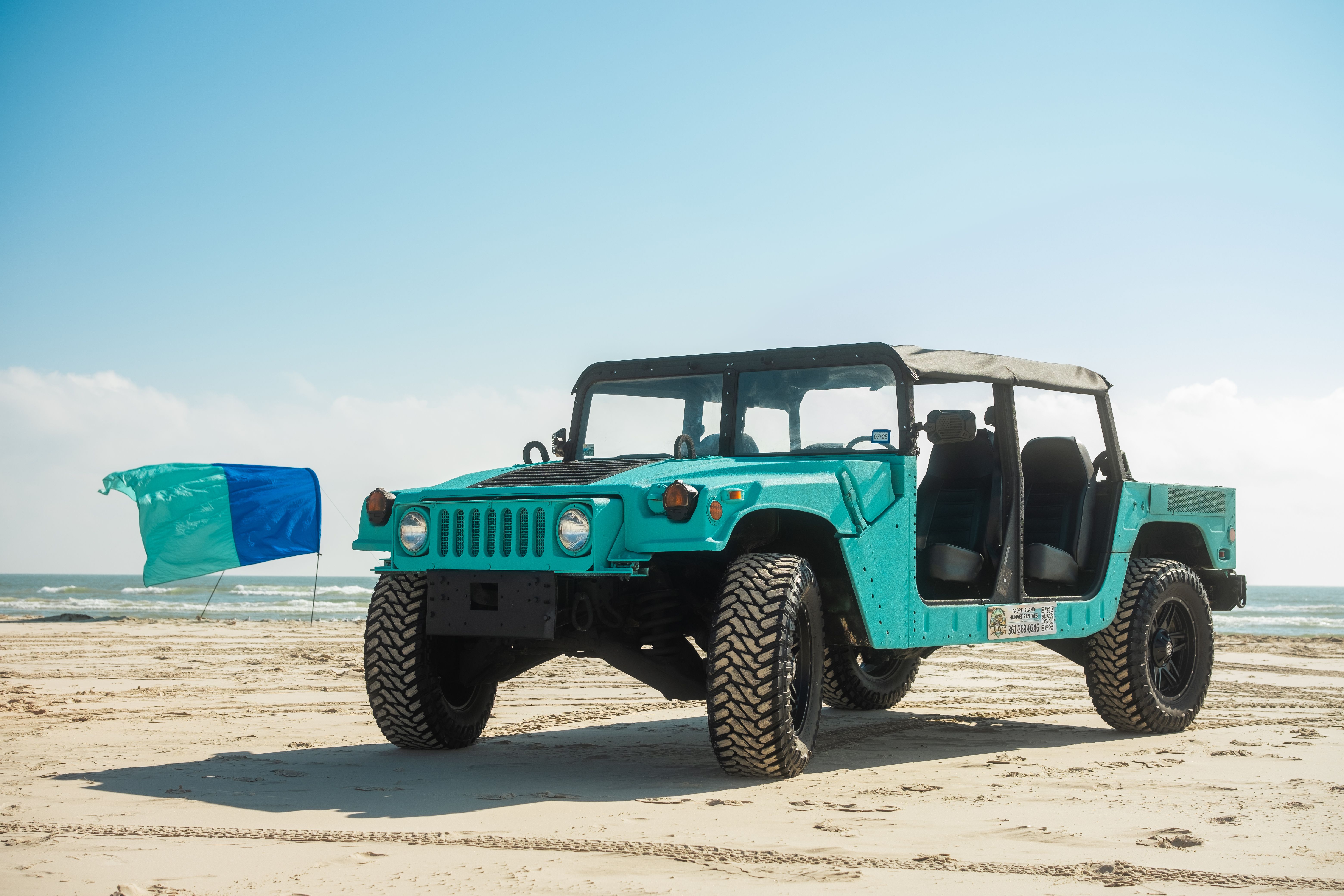Turquoise Humvee on Sandy Beach Adventure · Free Stock Photo