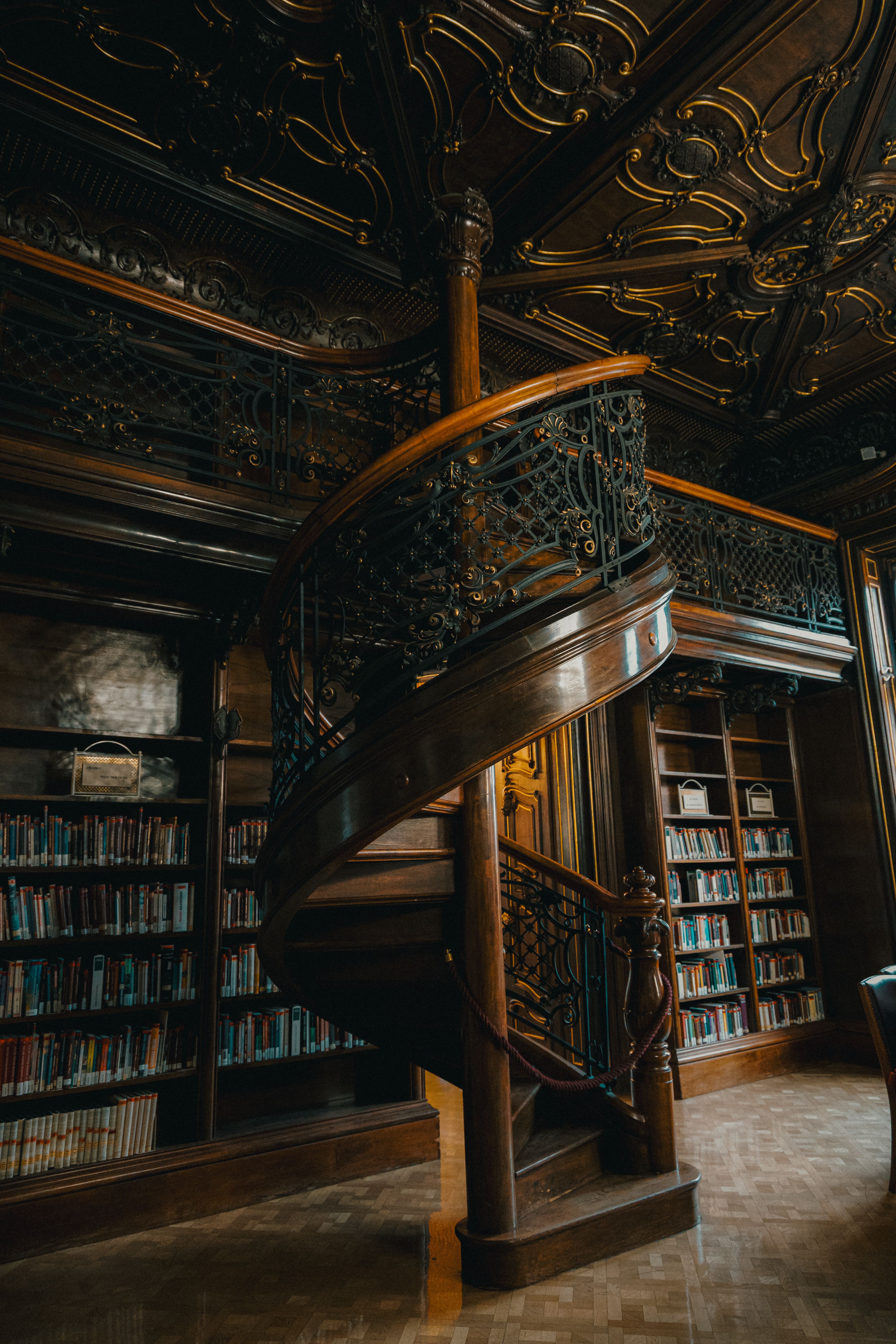 Ornate Spiral Staircase in Historic Library · Free Stock Photo