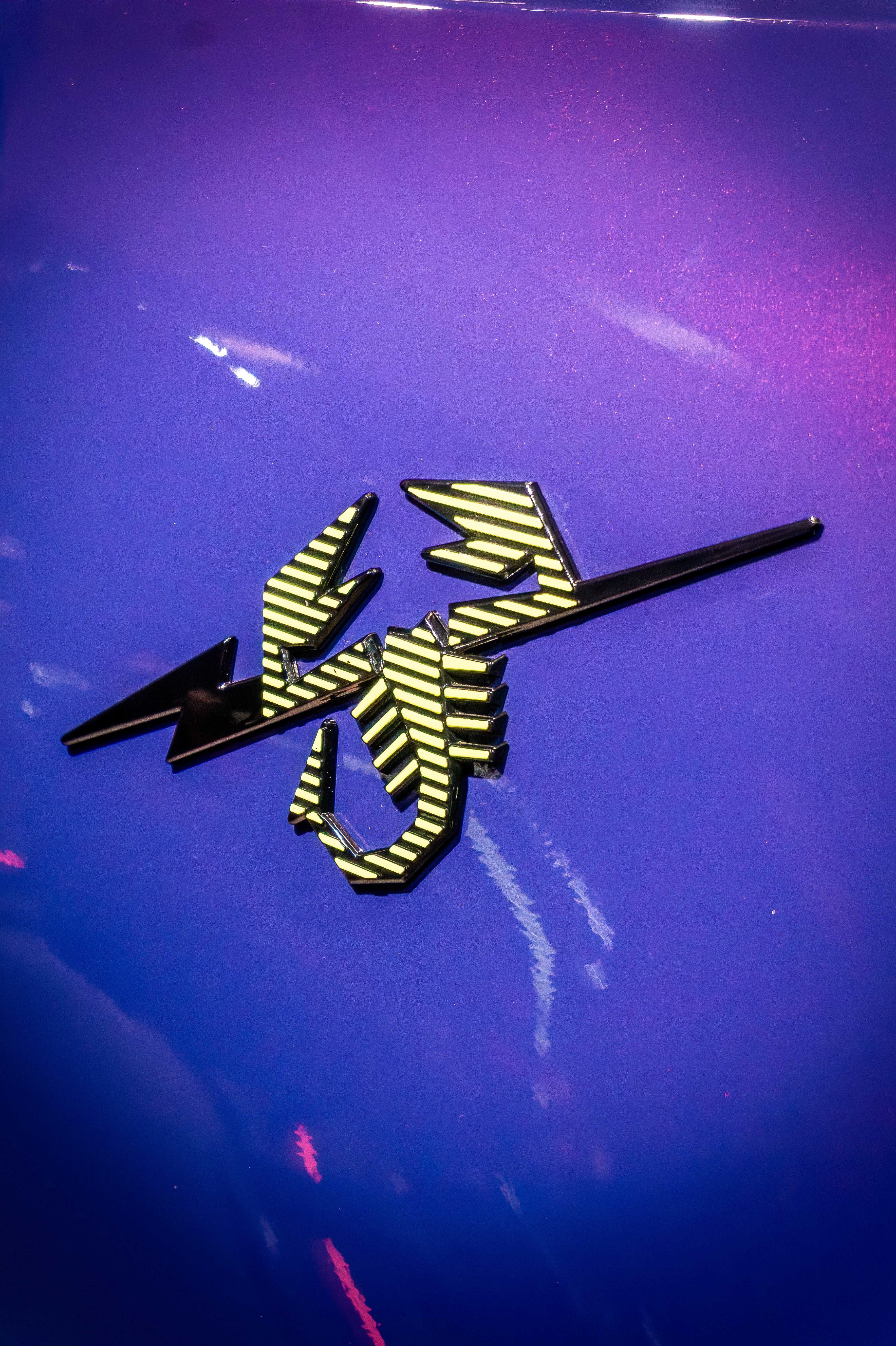 Close-up of Modern Emblem on Blue Vehicle · Free Stock Photo