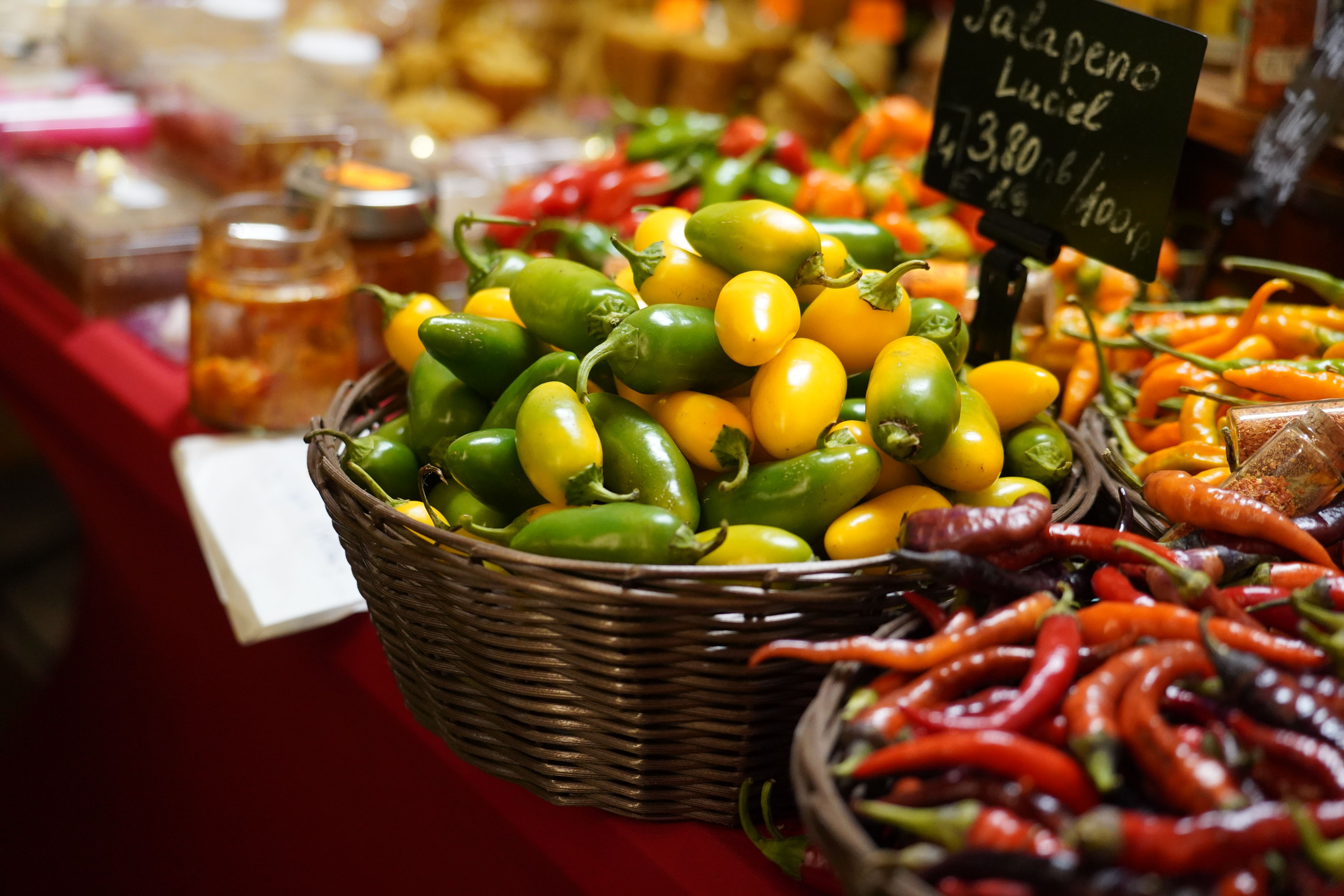 Vibrant Assortment of Peppers at Market · Free Stock Photo