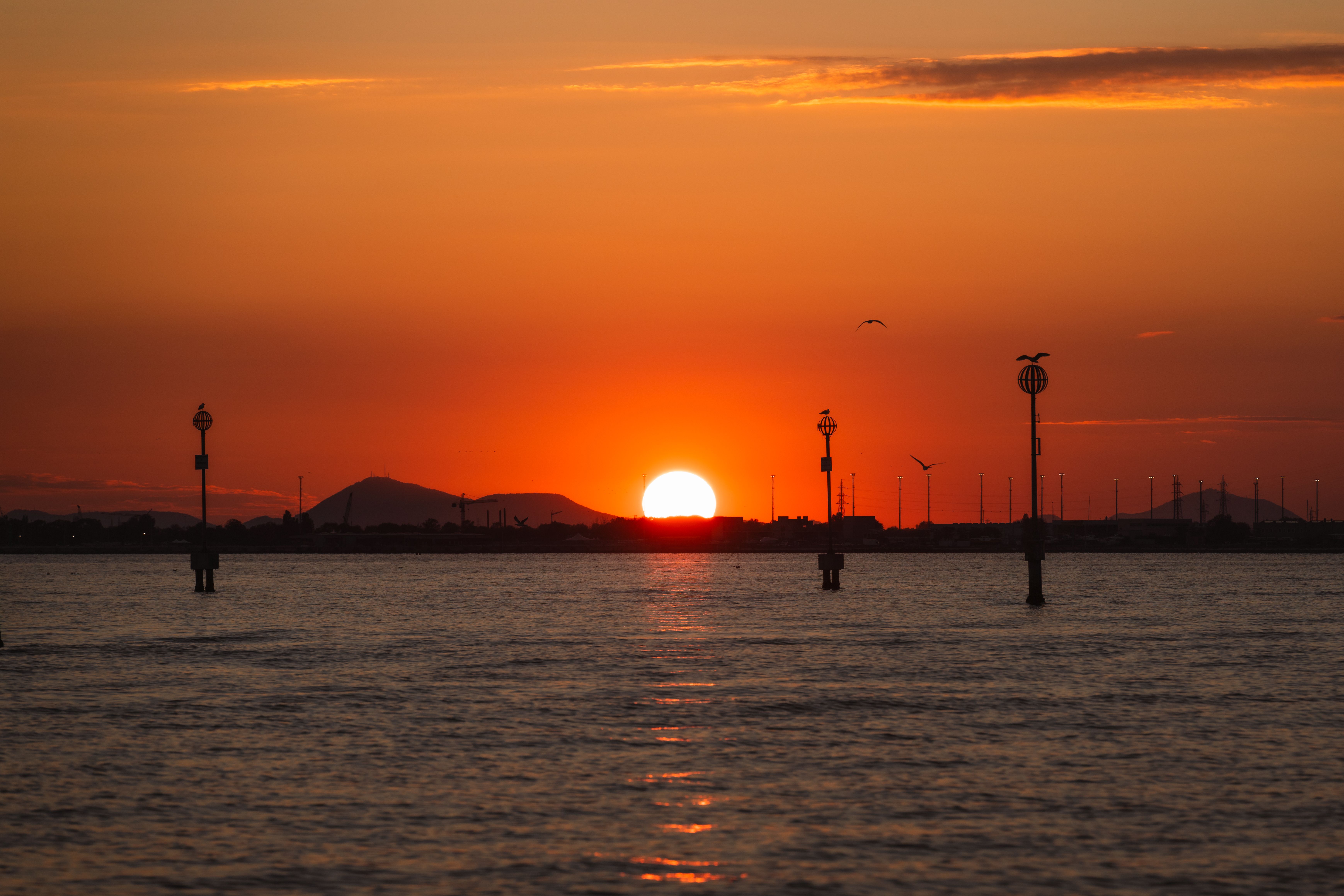 Stunning Sunset Over Calm Ocean Waters · Free Stock Photo