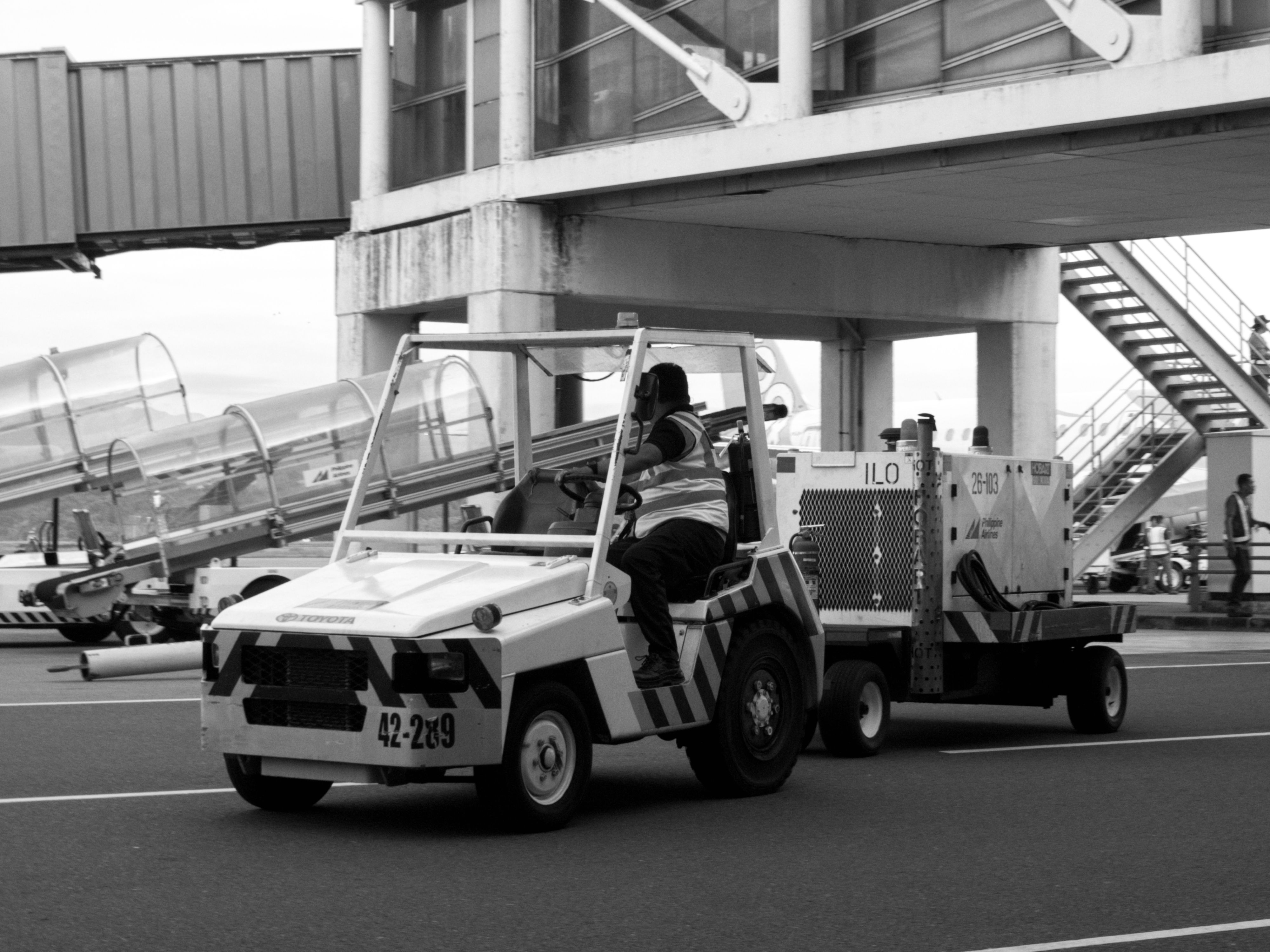 Airport Ground Operations with Tug Vehicle · Free Stock Photo