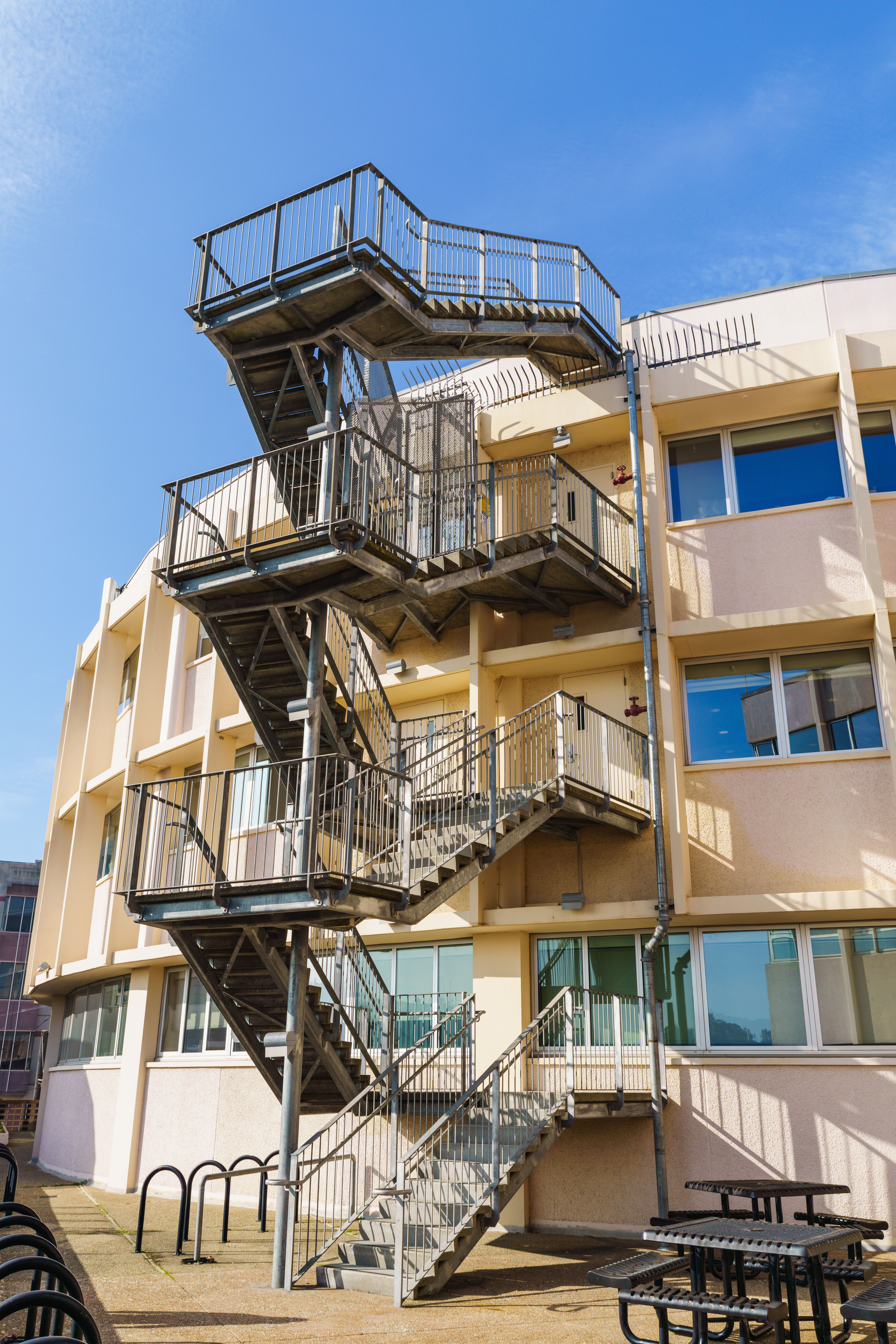 Outdoor Metal Fire Escape Stairs on Building · Free Stock Photo