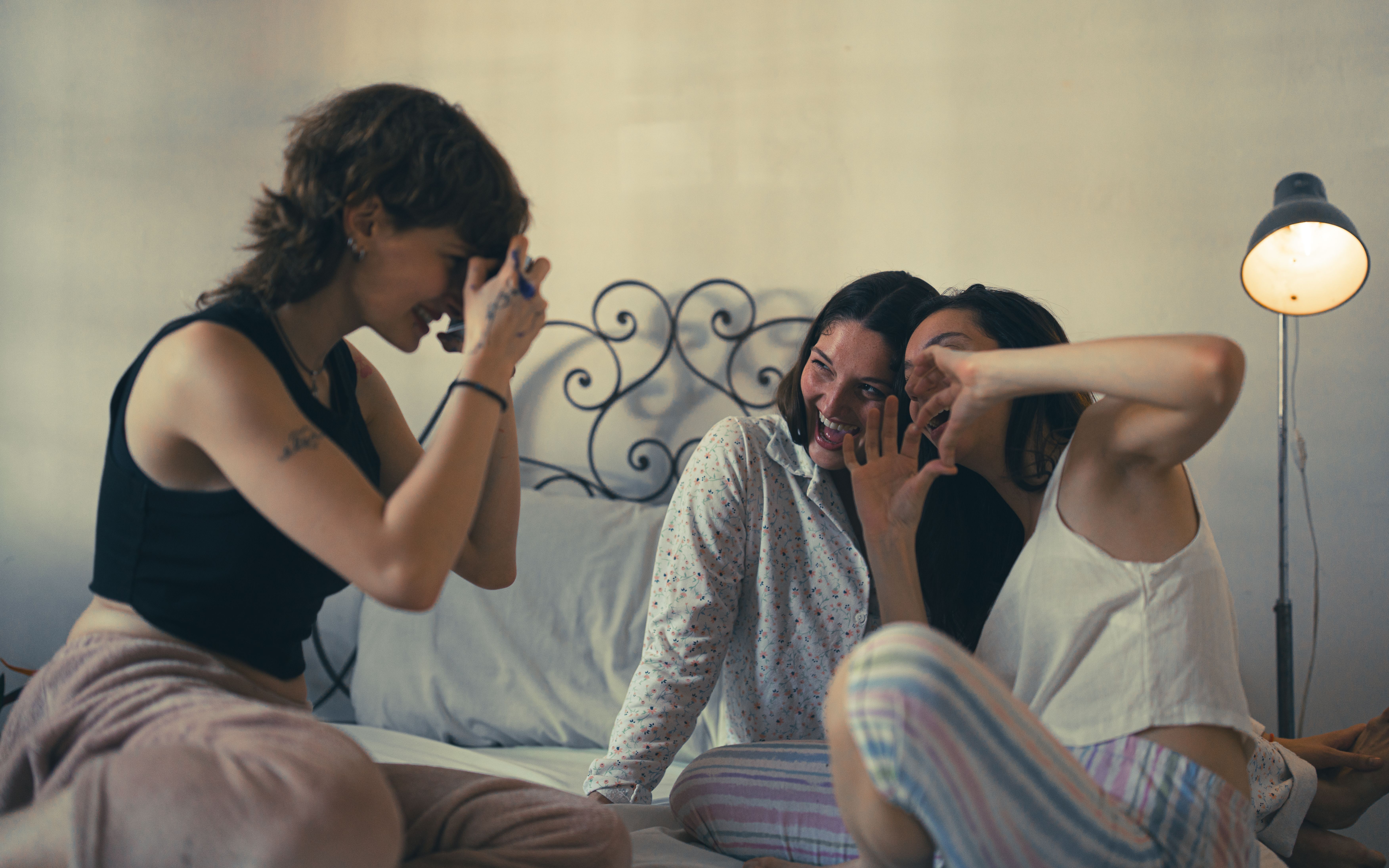 Friends Enjoying a Fun Sleepover Together Indoors · Free Stock Photo